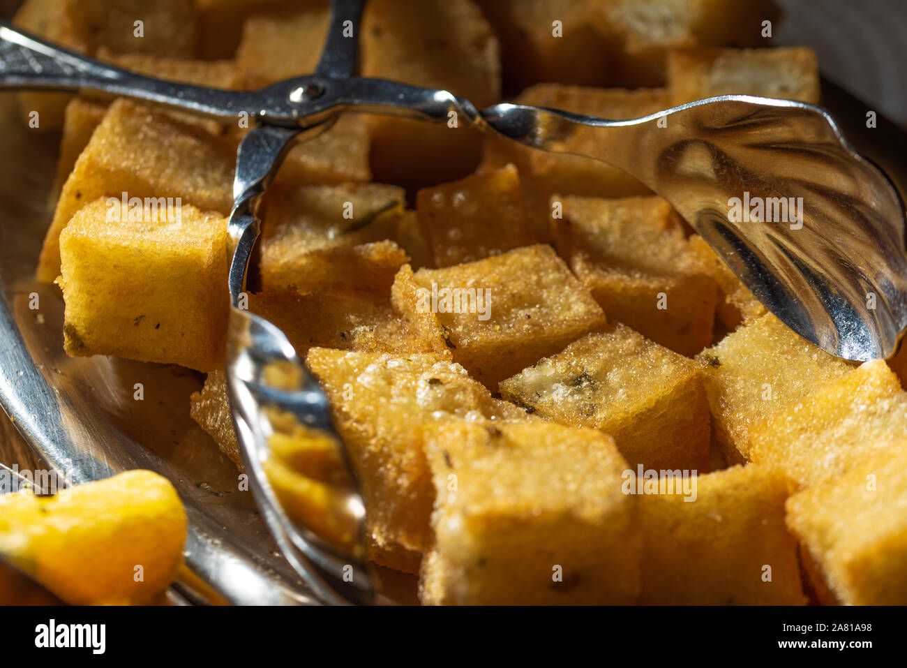 traditional Madeira fried corn cubes Stock Photo - Alamy