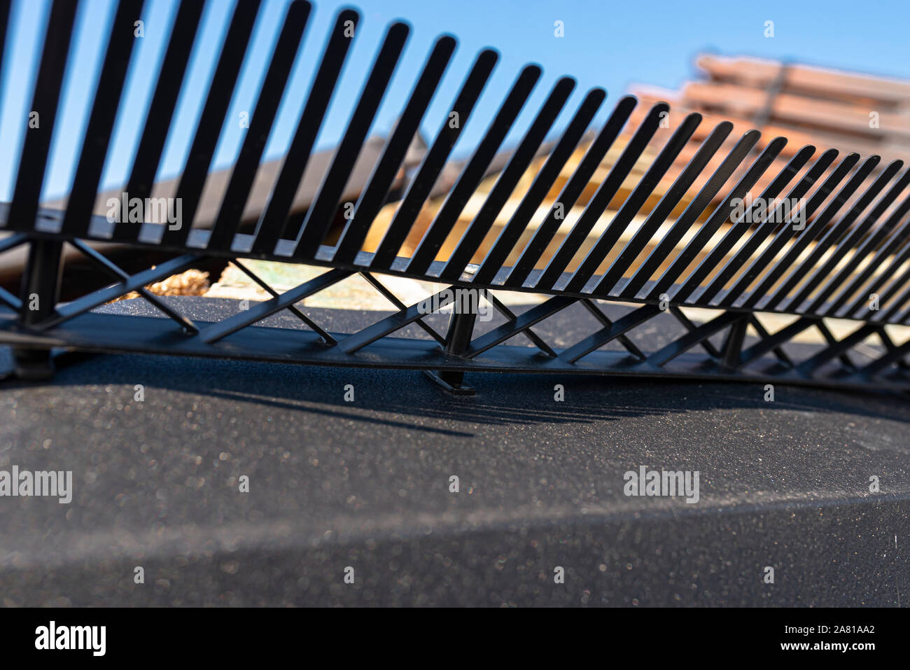 Eaves comb with ventilation grille mounted on the newly built roof ...