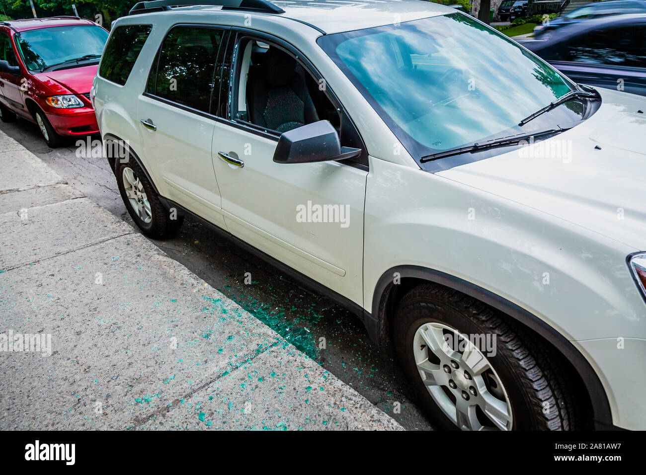 Montreal, Quebec - A vandalized car with the front passenger side ...