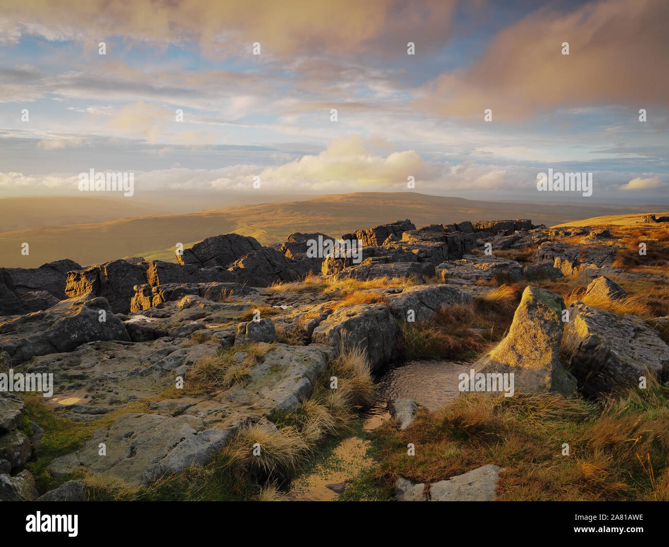 Sunset from the rocky top of Great Whernside overlooking Wharfedale ...