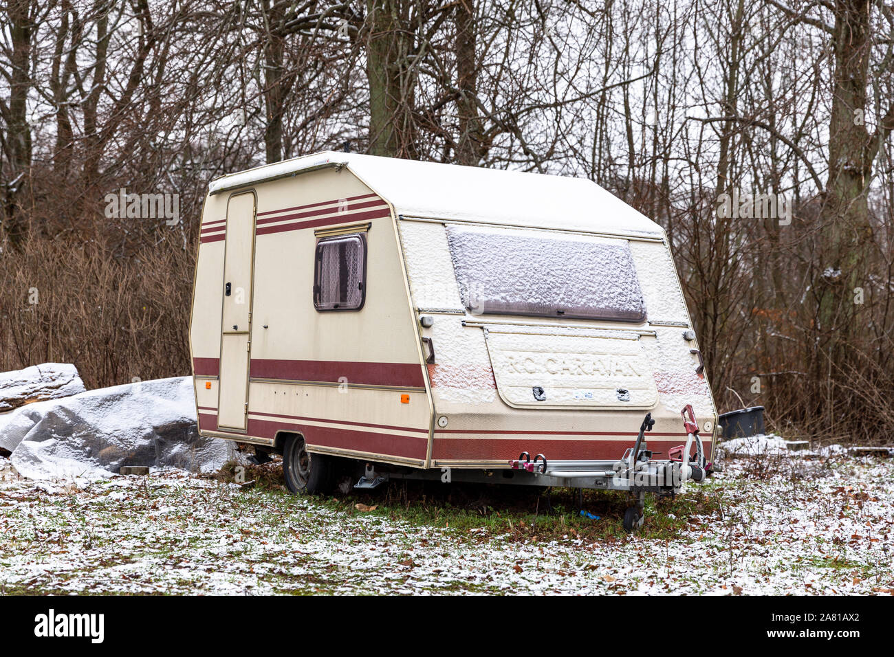 Parked caravan covered in a thin layer of snow Stock Photo - Alamy
