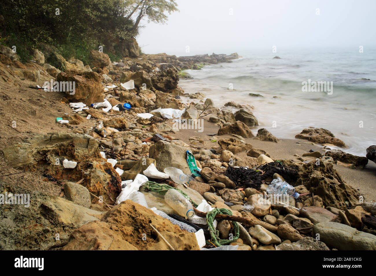 Environmental disaster, Sand beach full of wastes and plastics Stock ...