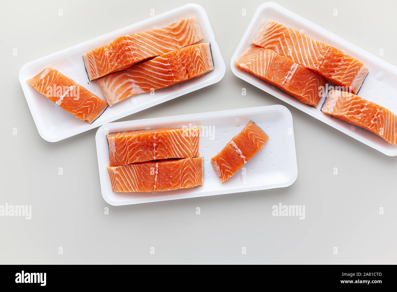 fresh salmon, cut into pieces and ready for cooking. fish cutting Stock ...