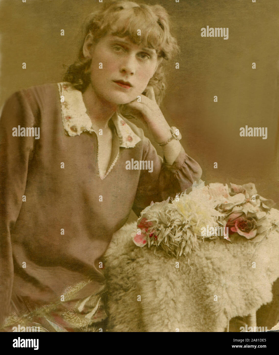 1928 year. Portrait of a young girl at the age of 18. Professional ...