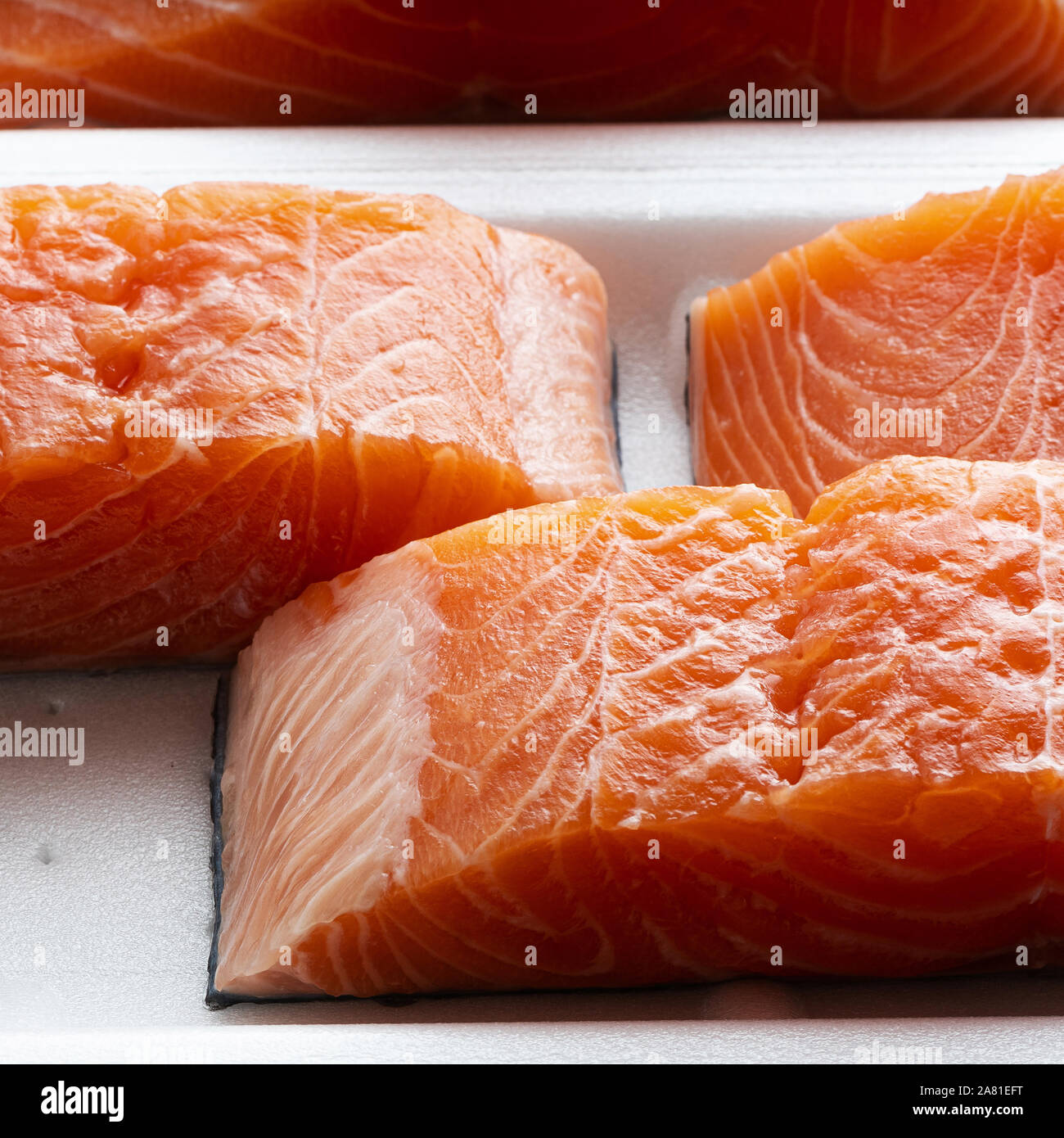 fresh salmon, cut into pieces and ready for cooking. fish cutting Stock ...