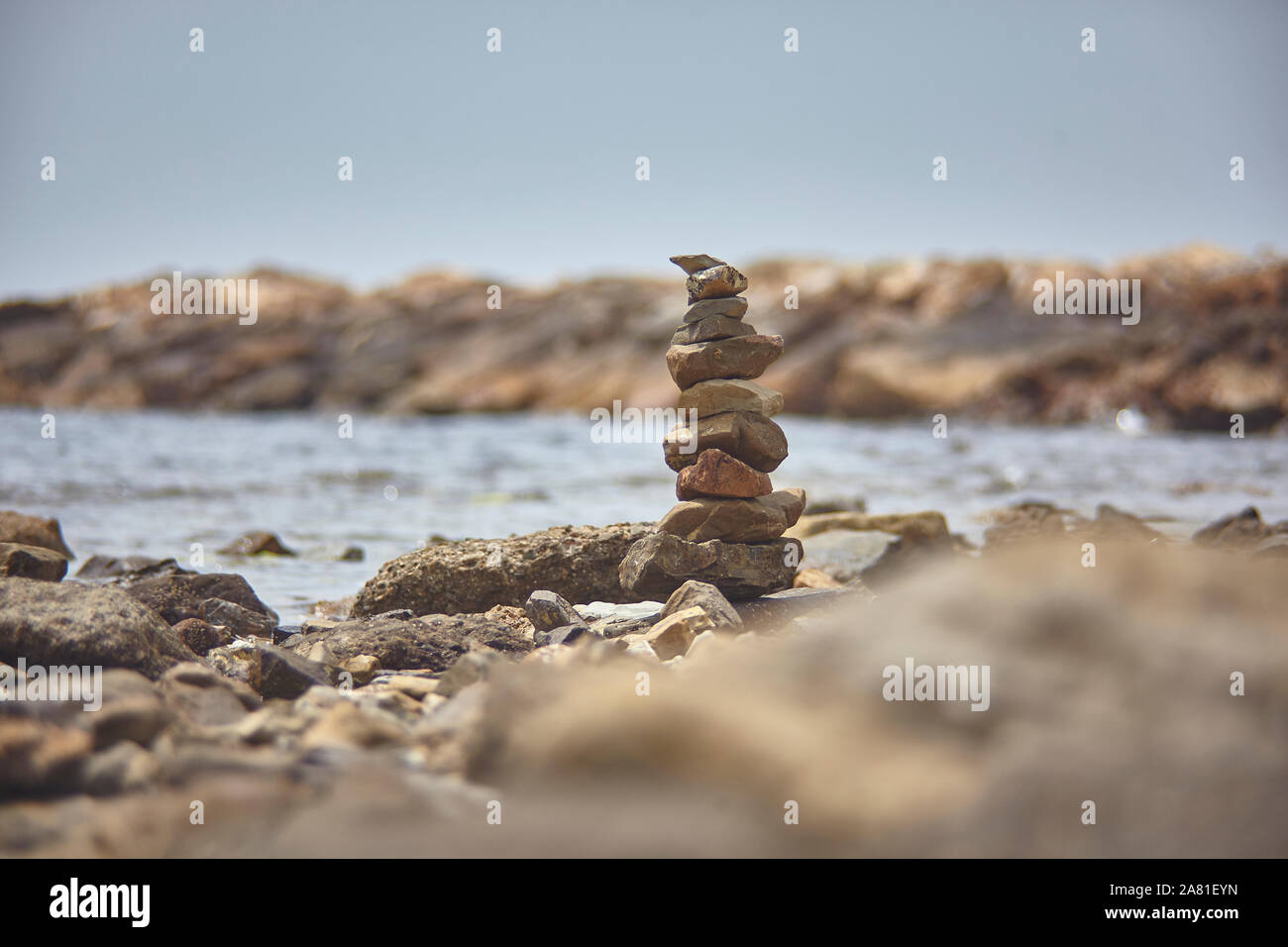Zen symbol: stack of rocks on the beach Stock Photo - Alamy