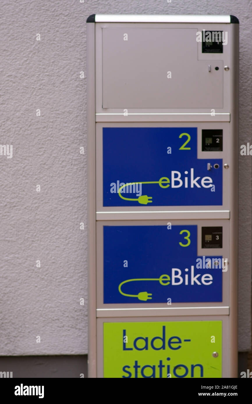 A charging station for e-bikes with digital displays and symbols Stock ...