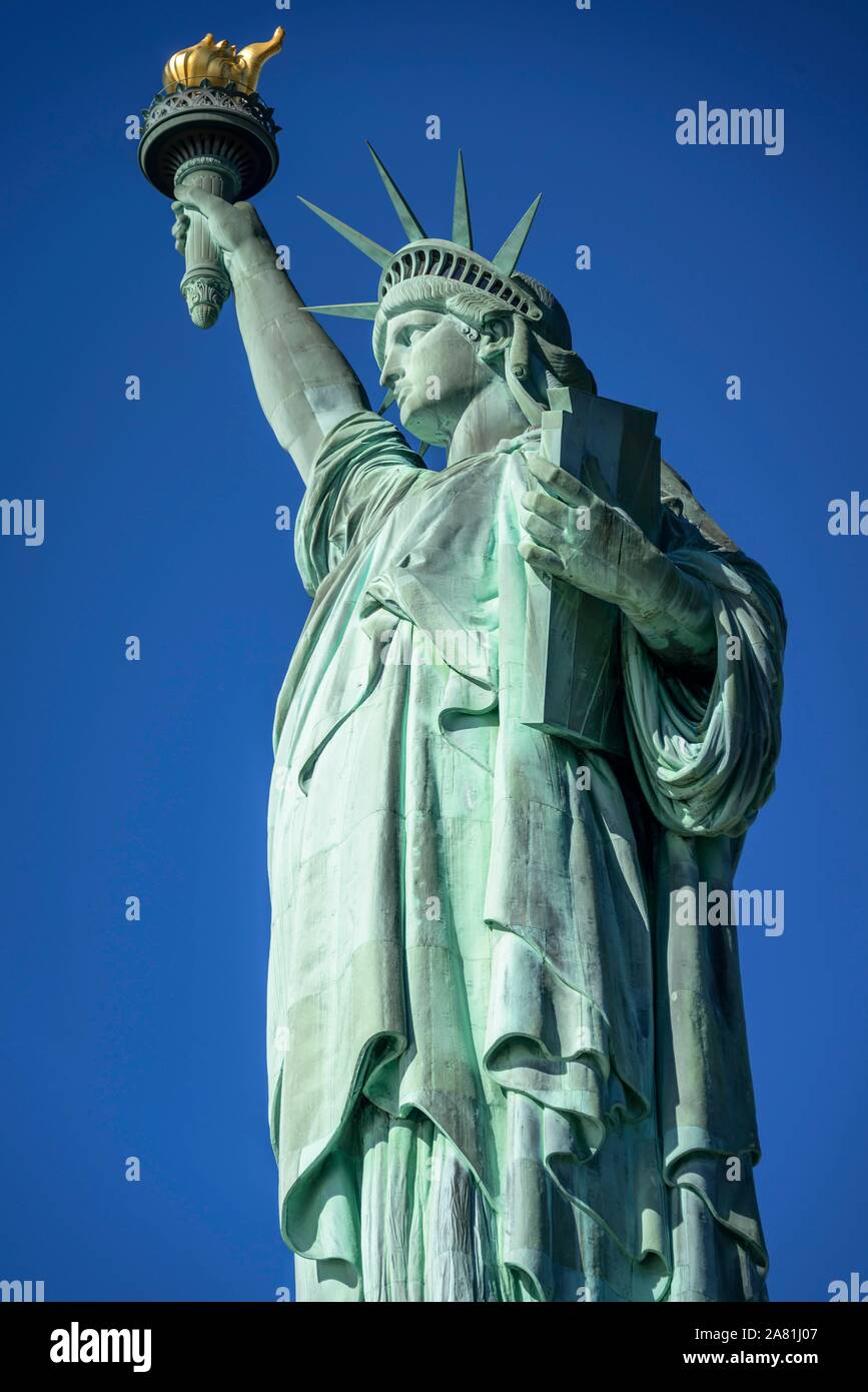 Statue of Liberty in front of blue sky, Liberty Island, Statue of ...