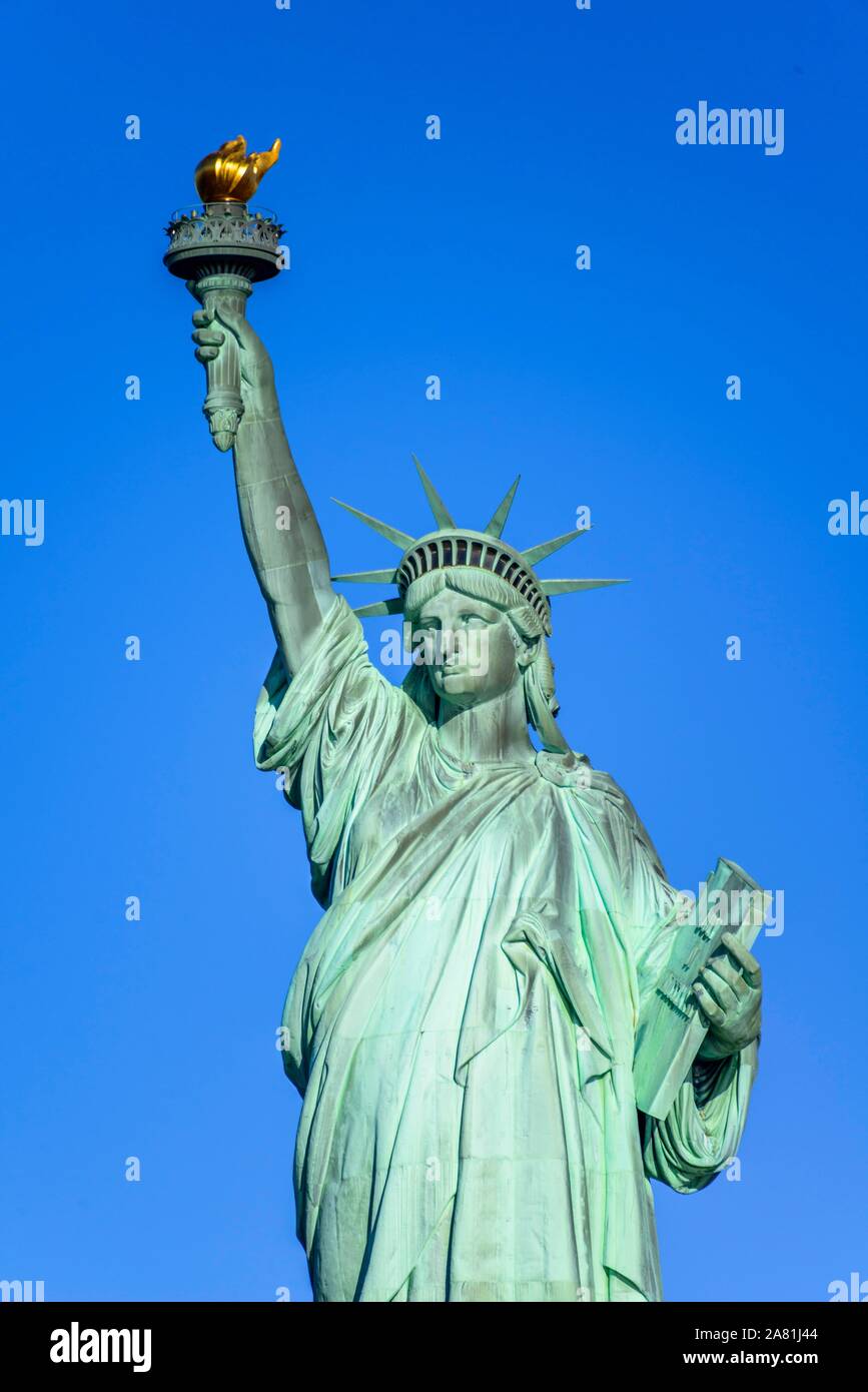 Statue of Liberty in front of blue sky, Liberty Island, Statue of ...