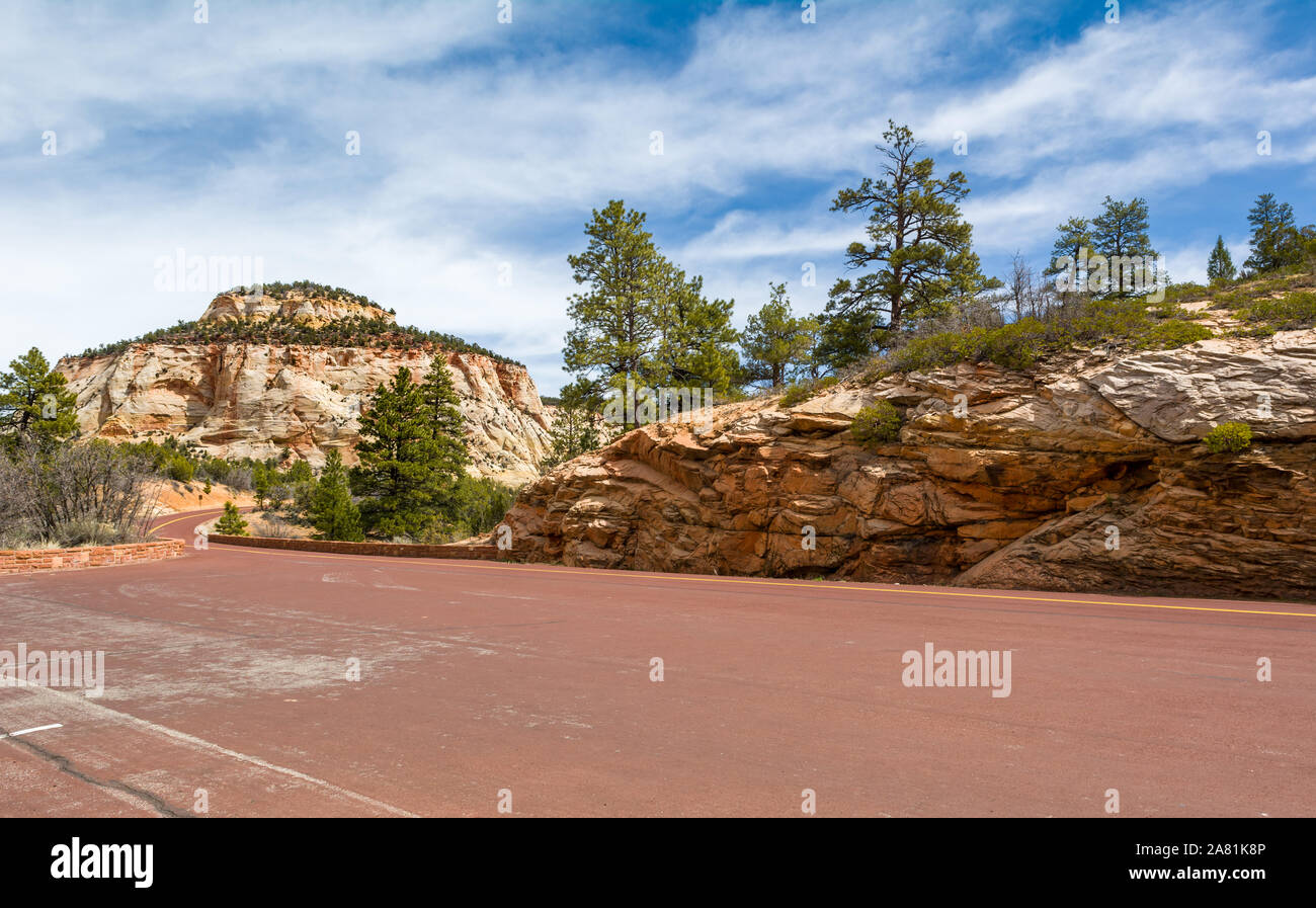 Landscape of rock hills and trees at Checkerboard Mesa in Zion National ...