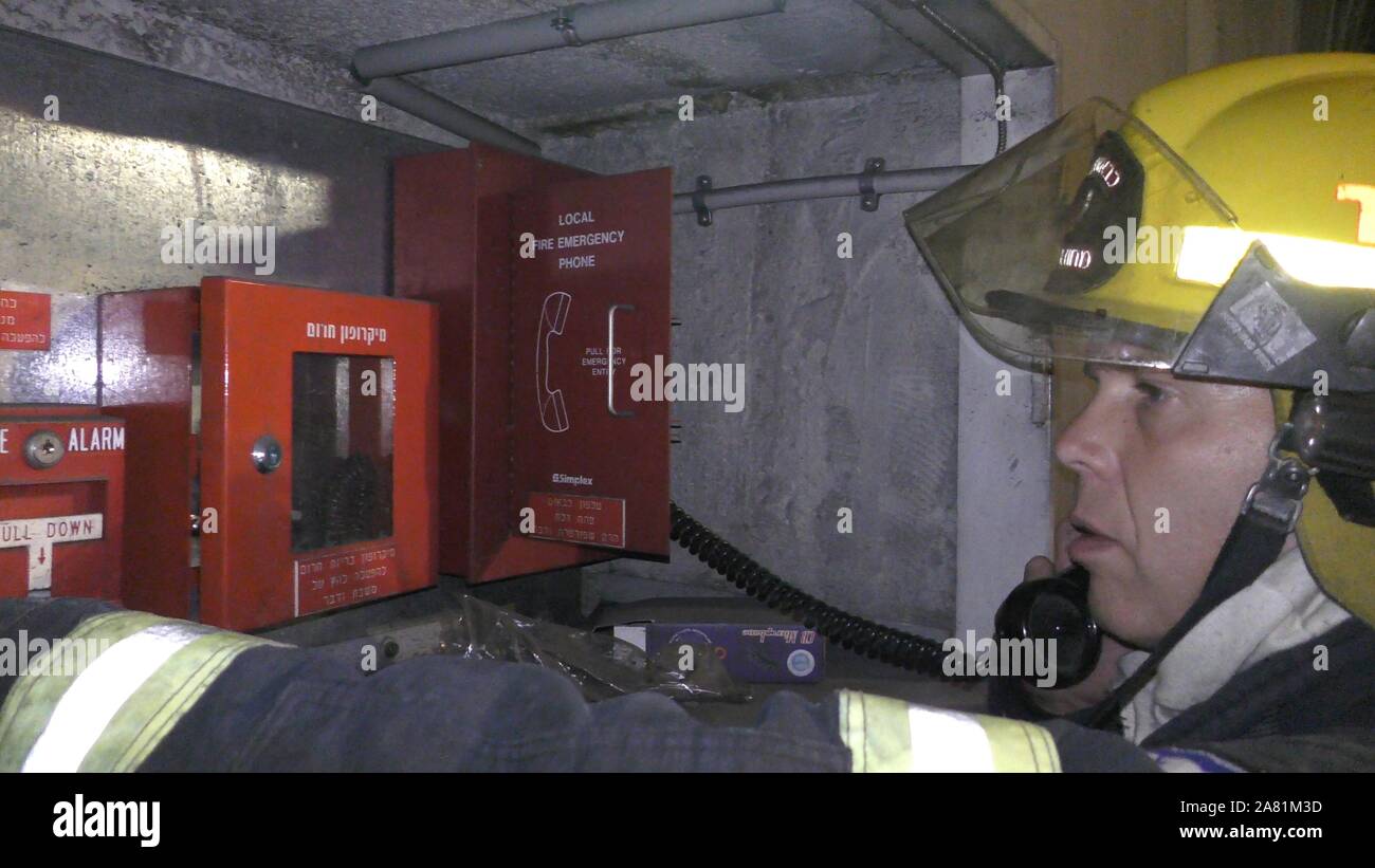A firefighter of the Nazareth fire brigade use emergency communications ...