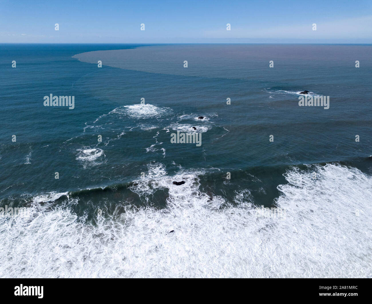 Russian River Drainage - Brown Russian River flood waters drain into ...