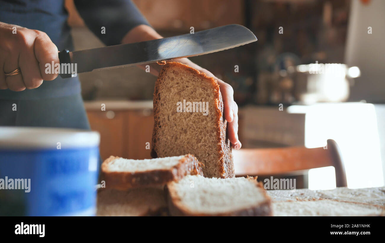 Woman cuts butter dough hi-res stock photography and images - Alamy