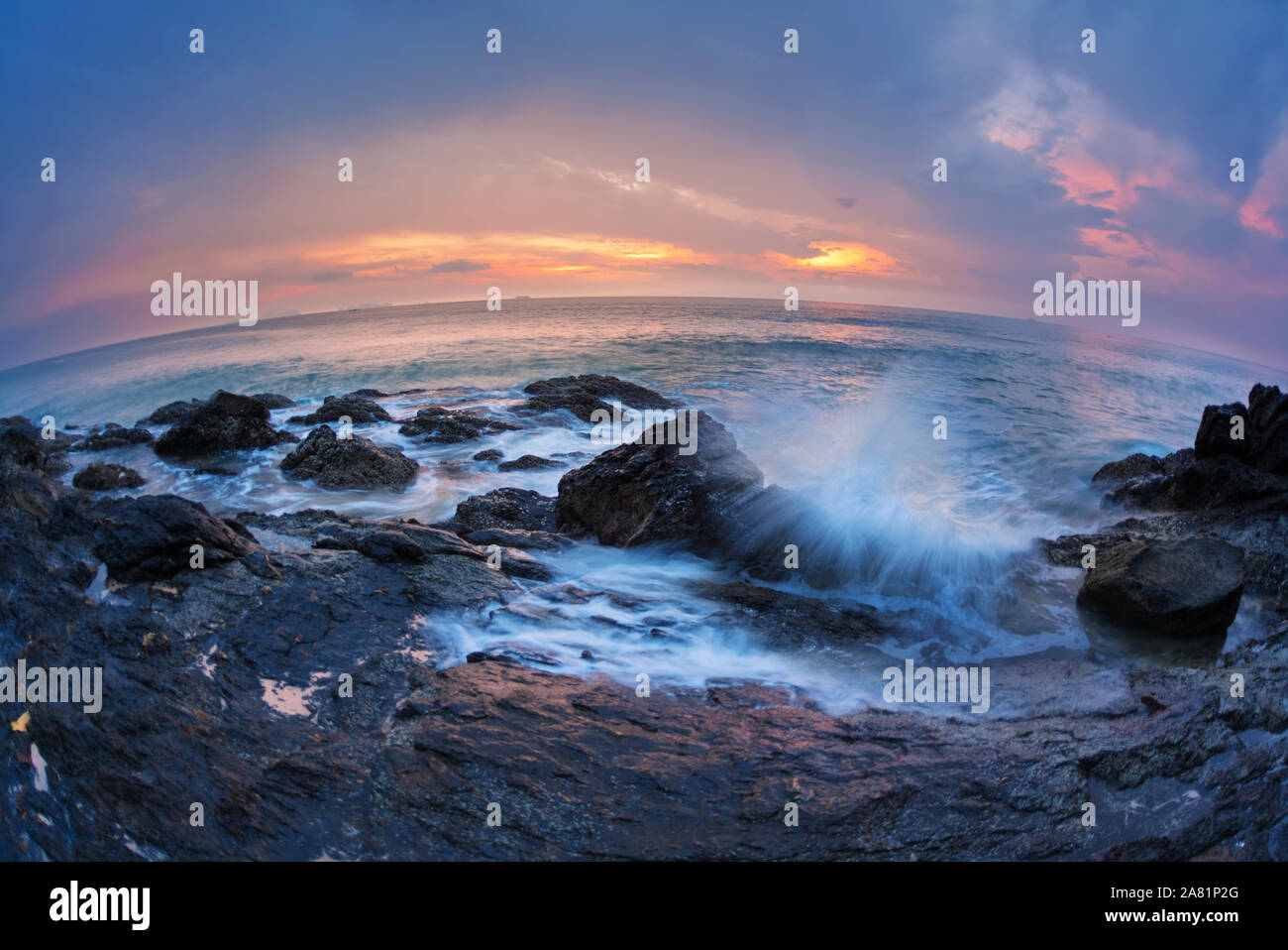 Tropical beach at beautiful sunset in fish-eye lense. Nature background ...