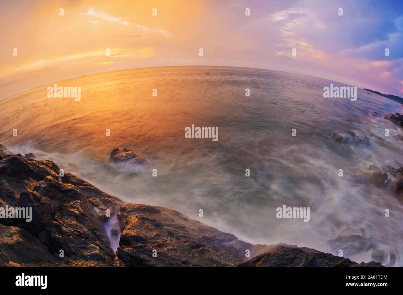 Tropical beach at beautiful sunset in fish-eye lense. Nature background ...