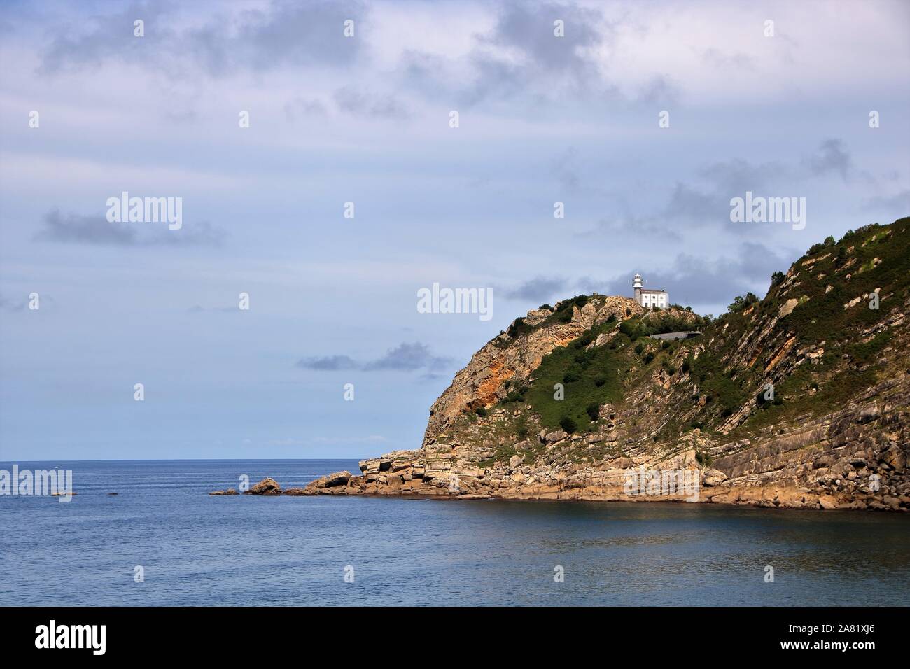 The lighthouse of Getaria from Zarautz beach and landscape of basque ...