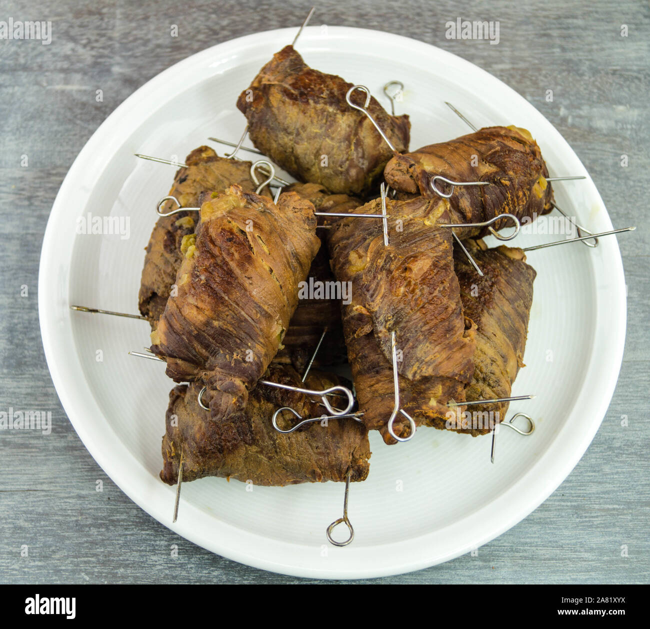 traditional german Food Beef Roulade with red cabbage Stock Photo - Alamy