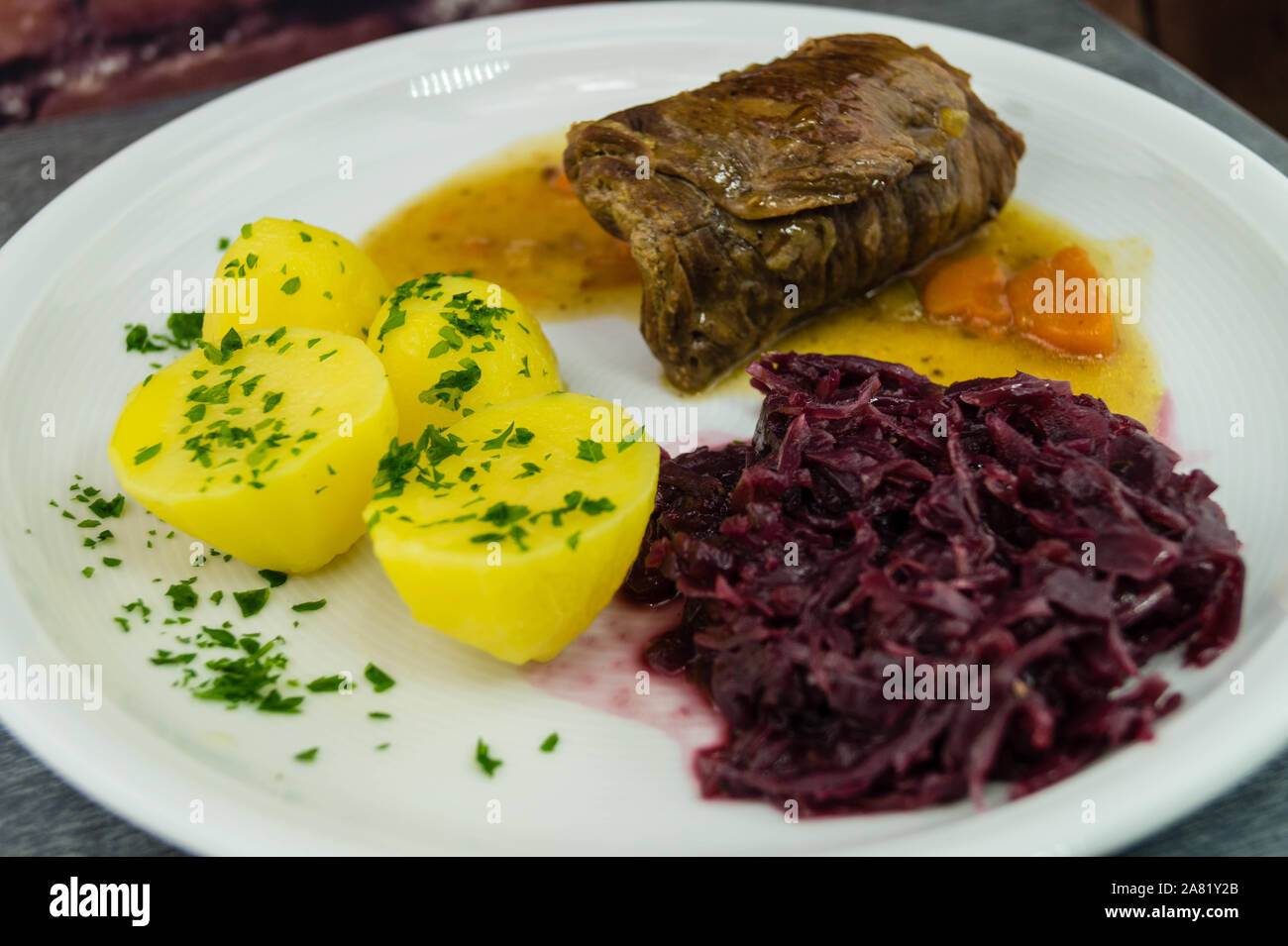 traditional german Food Beef Roulade with red cabbage Stock Photo - Alamy