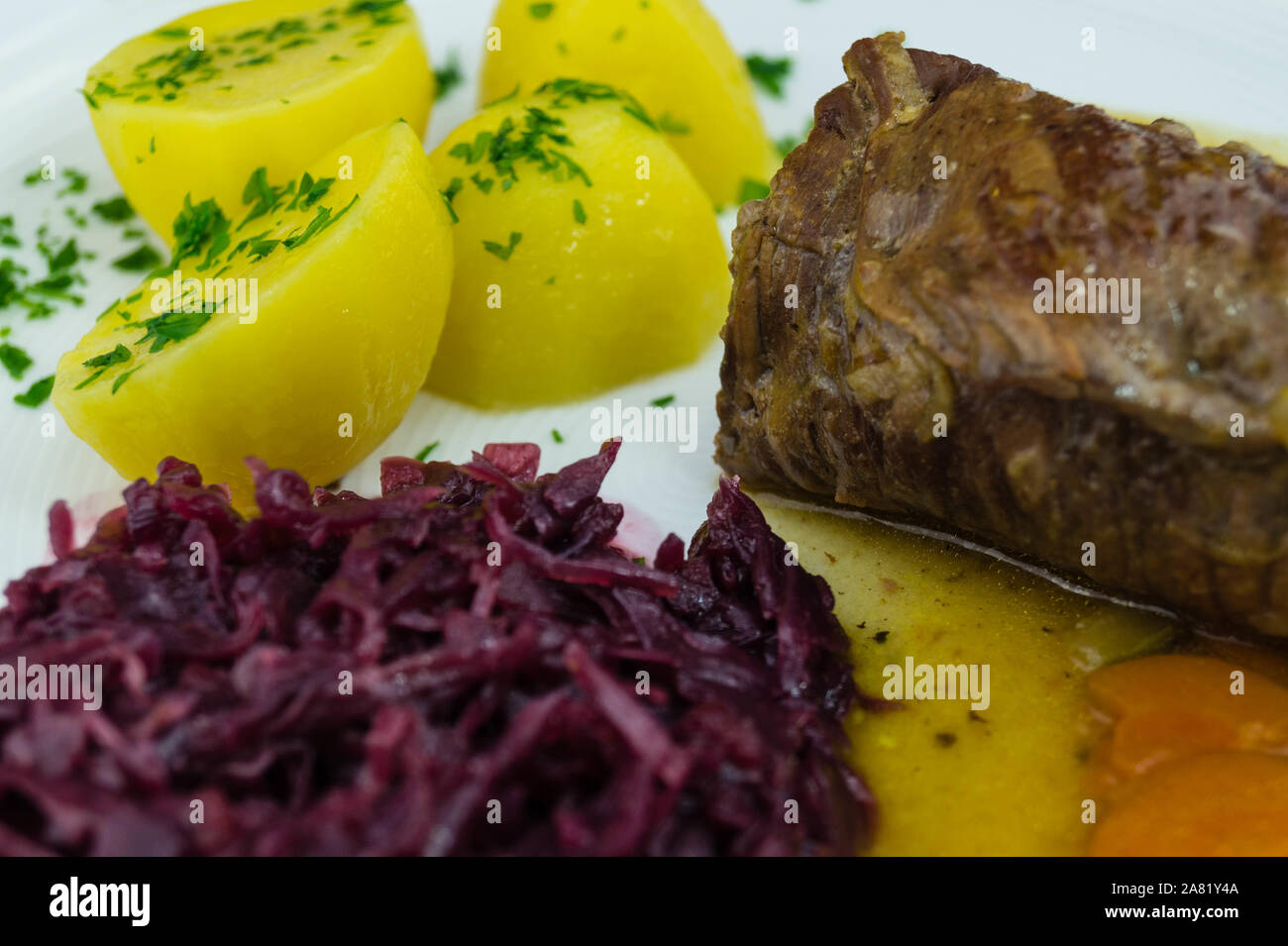 traditional german Food Beef Roulade with red cabbage Stock Photo - Alamy