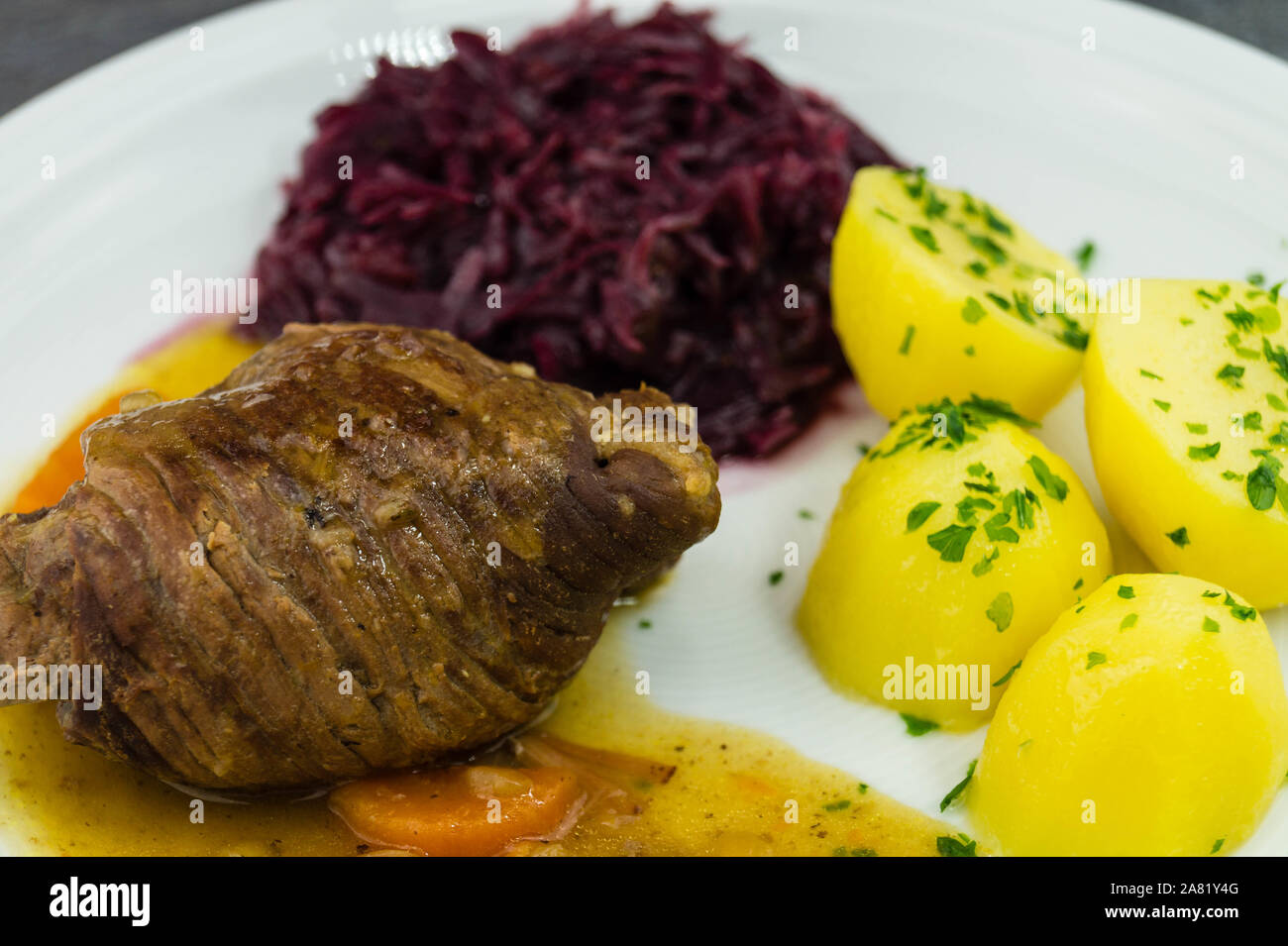traditional german Food Beef Roulade with red cabbage Stock Photo - Alamy