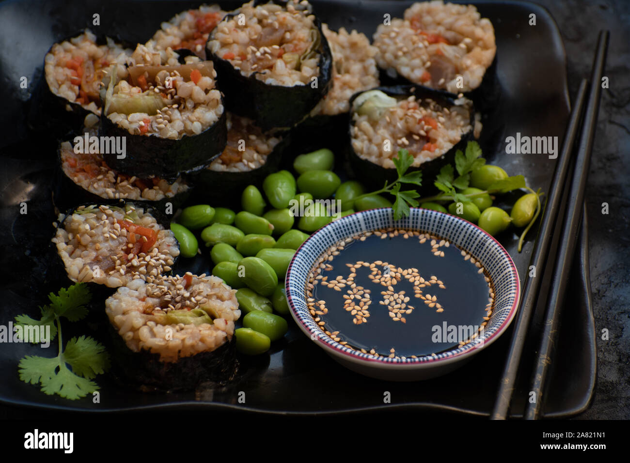 Korean kimchi and brown rice vegan kimbap Stock Photo - Alamy