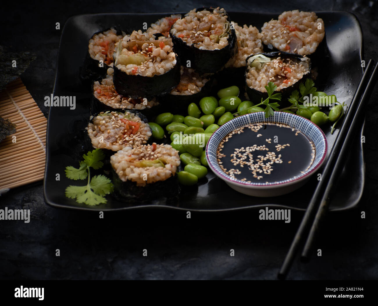Korean kimchi and brown rice vegan kimbap Stock Photo - Alamy