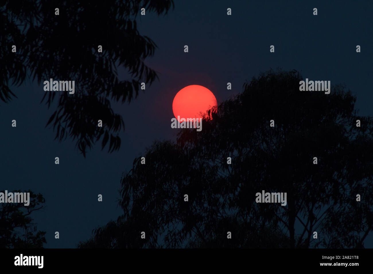The sun at noon behind the clouds hi-res stock photography and images ...