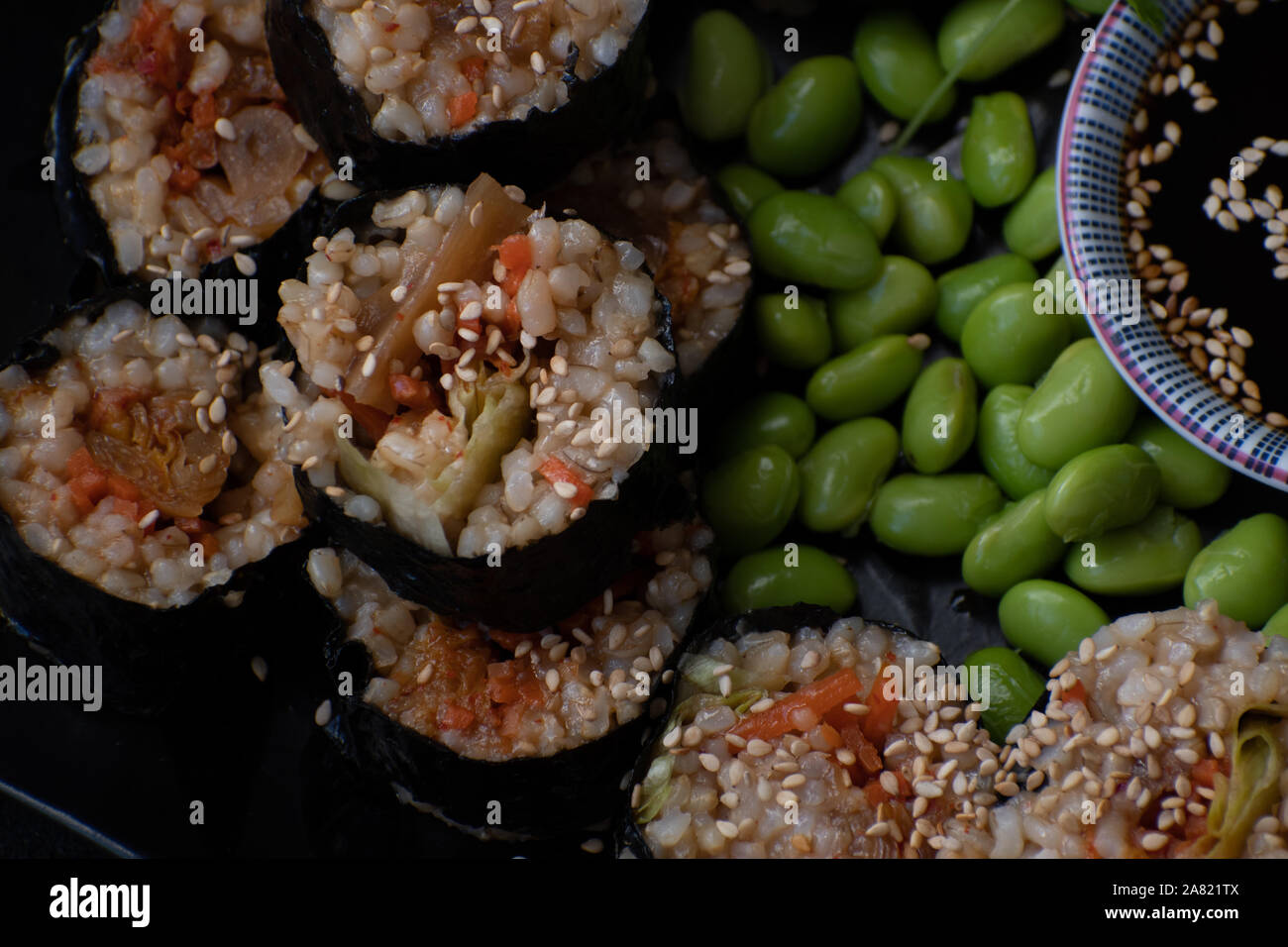 Korean kimchi and brown rice vegan kimbap Stock Photo - Alamy