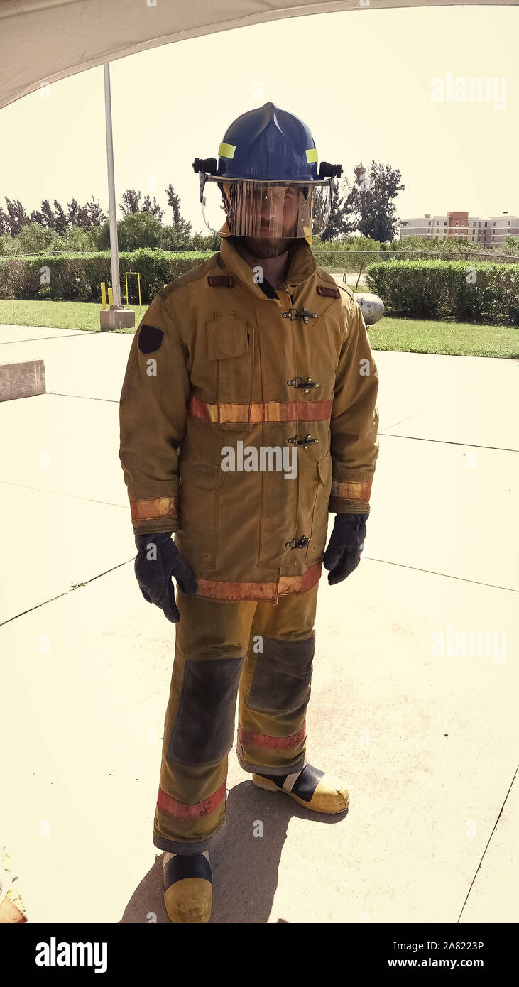 My job is extinguish fires. On guard. Firefighter with uniform and ...