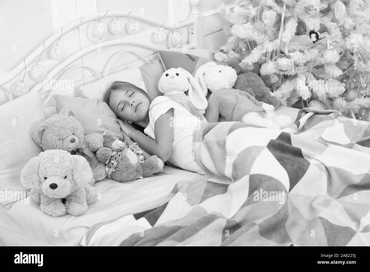 Christmas dreams. Sleeping child. Little child sleep at Christmas tree ...