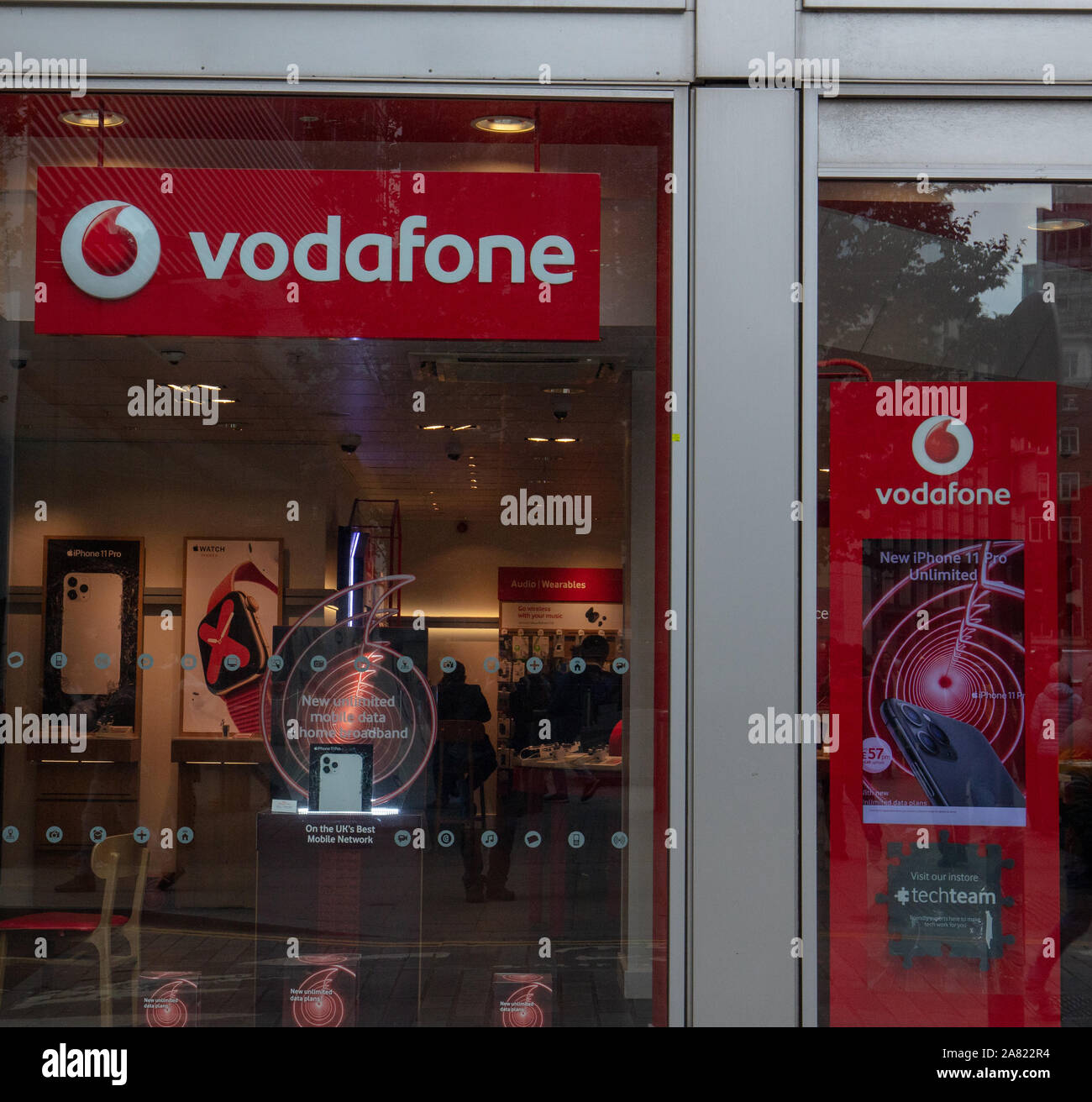 Vodafone logo seen in a shop in the City of London, UK in November ...