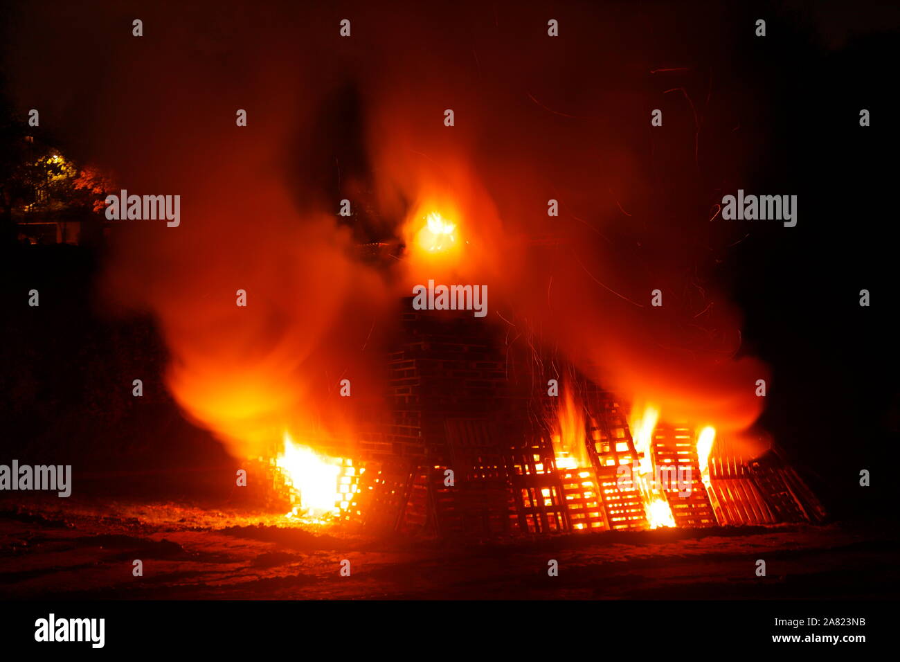 A bonfire at Rothwell Park in Leeds moments after being during bonfire ...