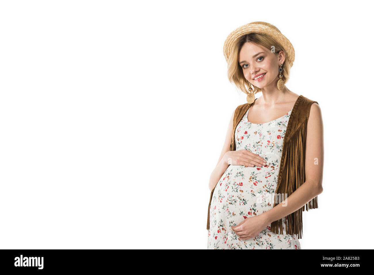 smiling pregnant hippie girl touching belly isolated on white Stock ...