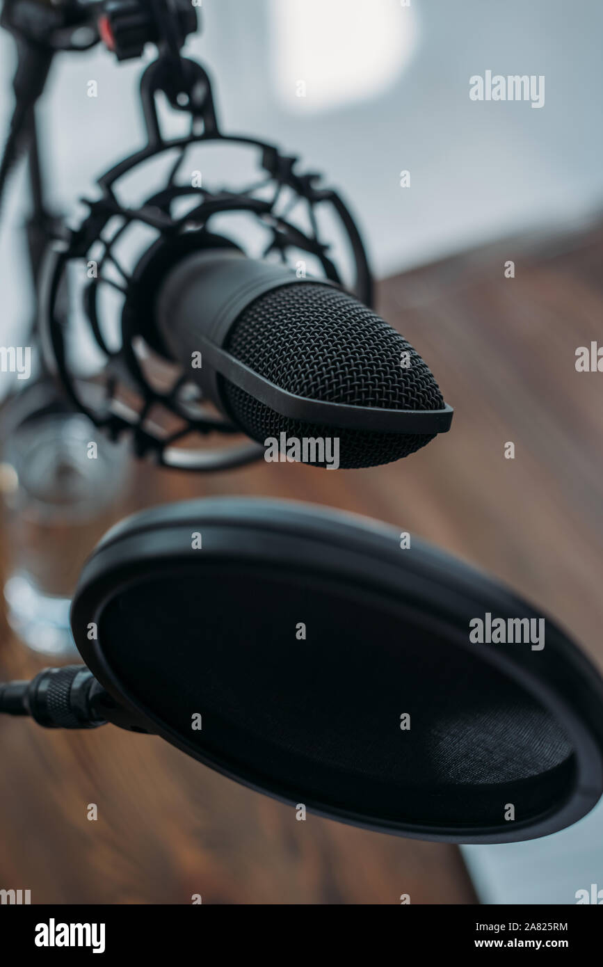 close up view of microphone with membrane in radio studio Stock Photo ...