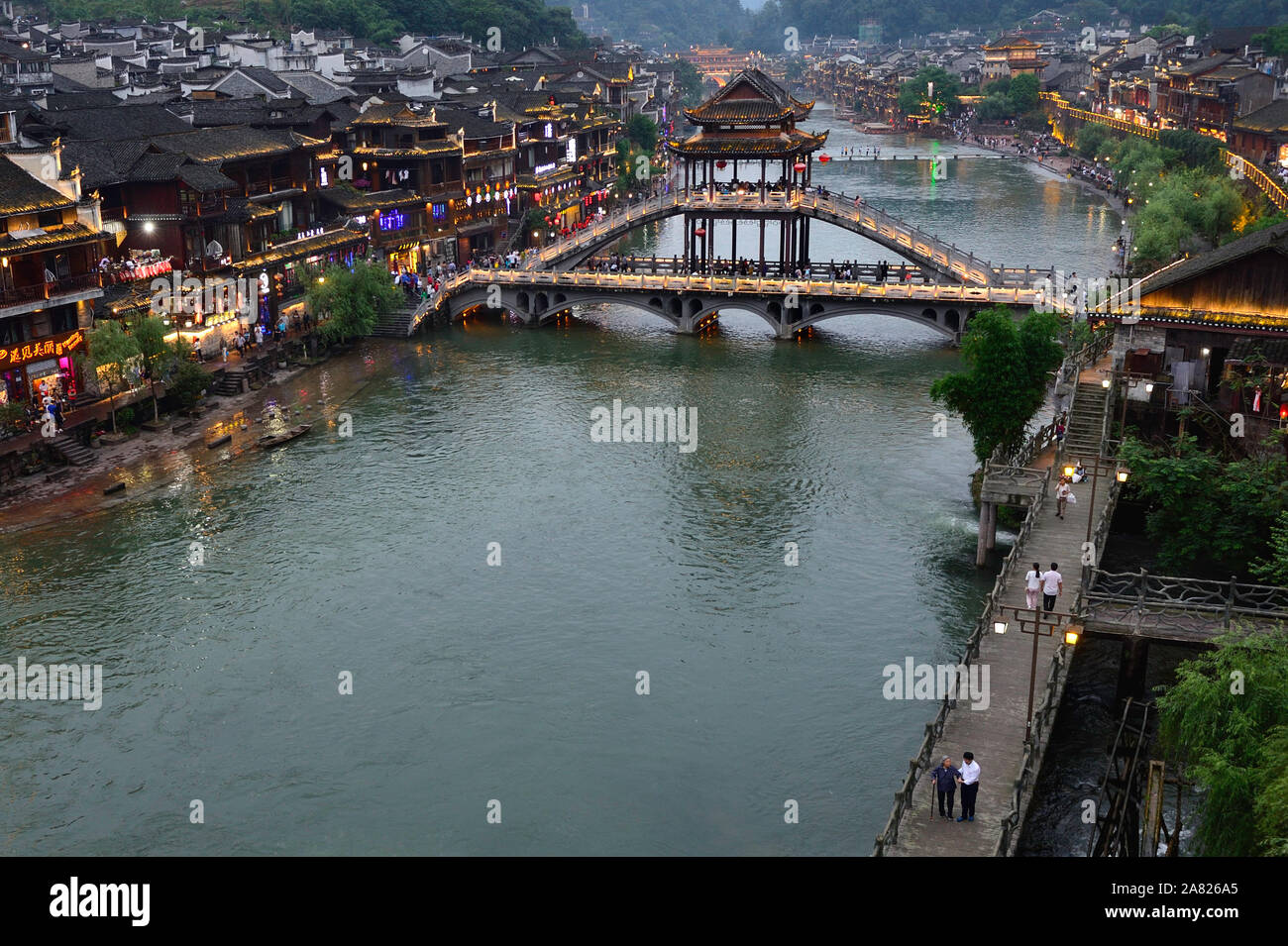 The Nanhua Bridge, a tower footbridge that crosses the Tuo Jiang River ...