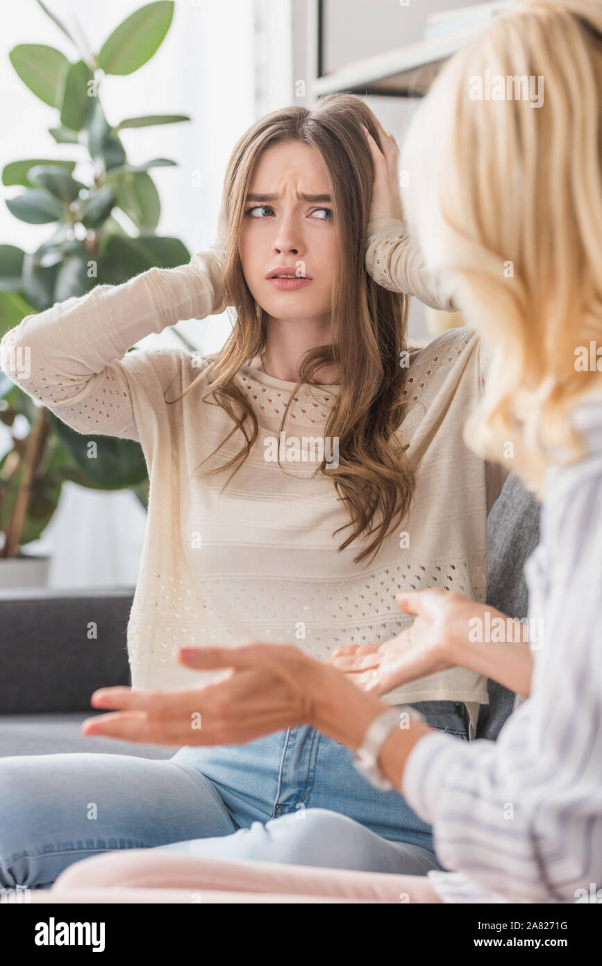 Girl plug ears hi-res stock photography and images - Alamy