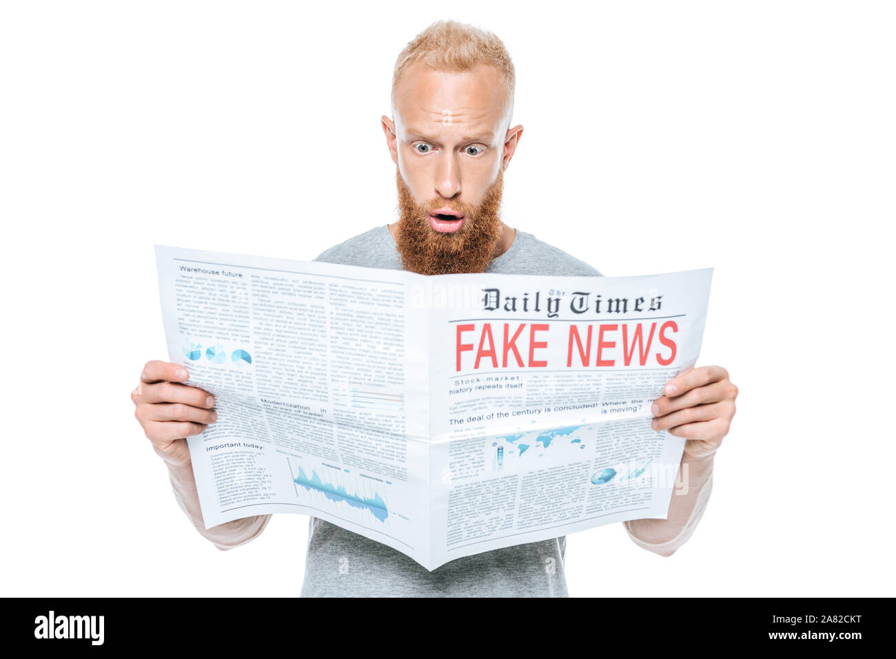 shocked bearded man reading newspaper with fake news, isolated on white ...