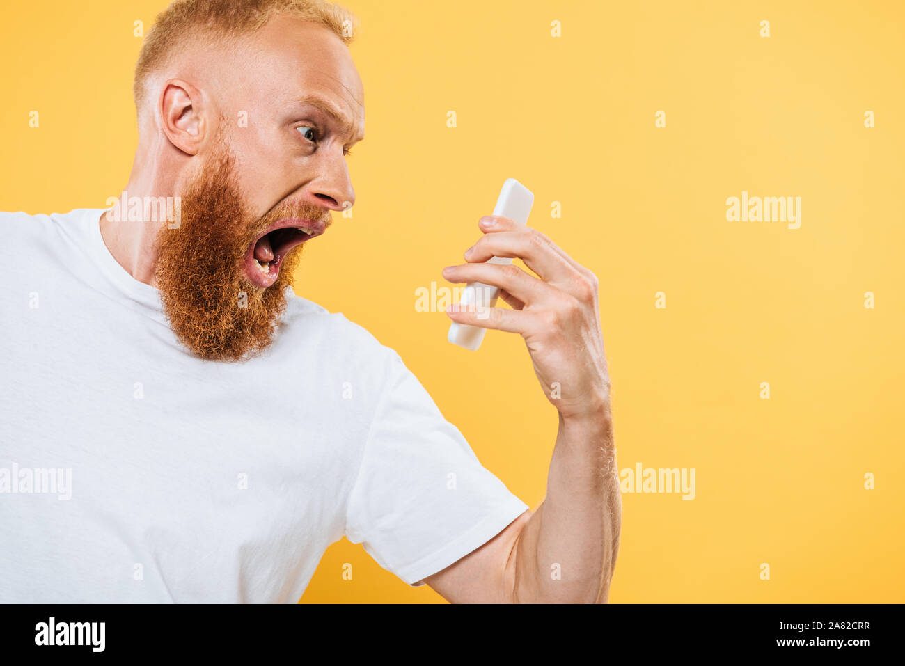 Angry yelling redhead man using hi-res stock photography and images - Alamy