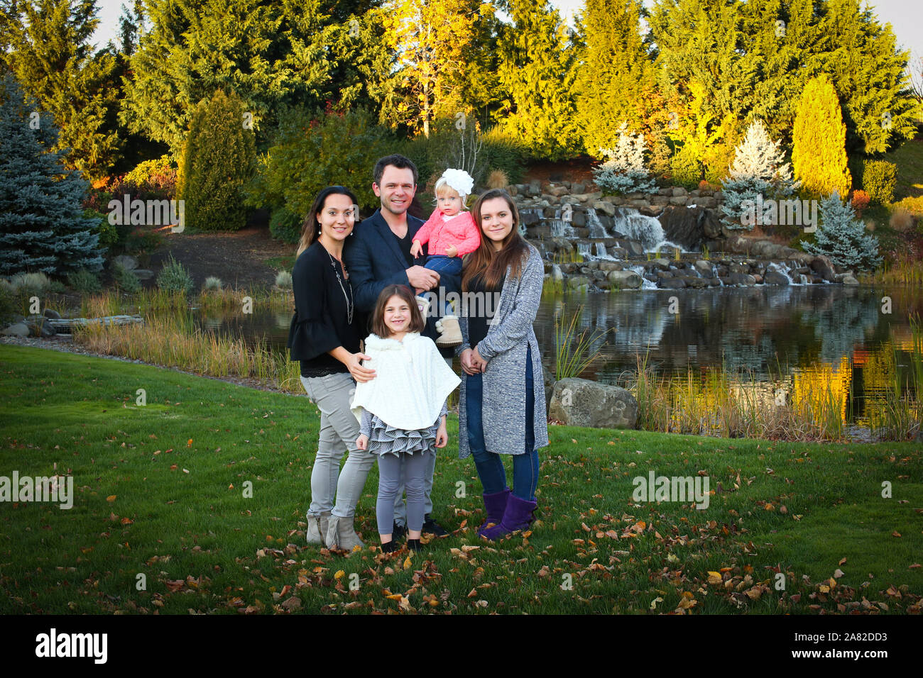 Happy Family, tree girls, daughters, beautiful mother and Happy Father ...