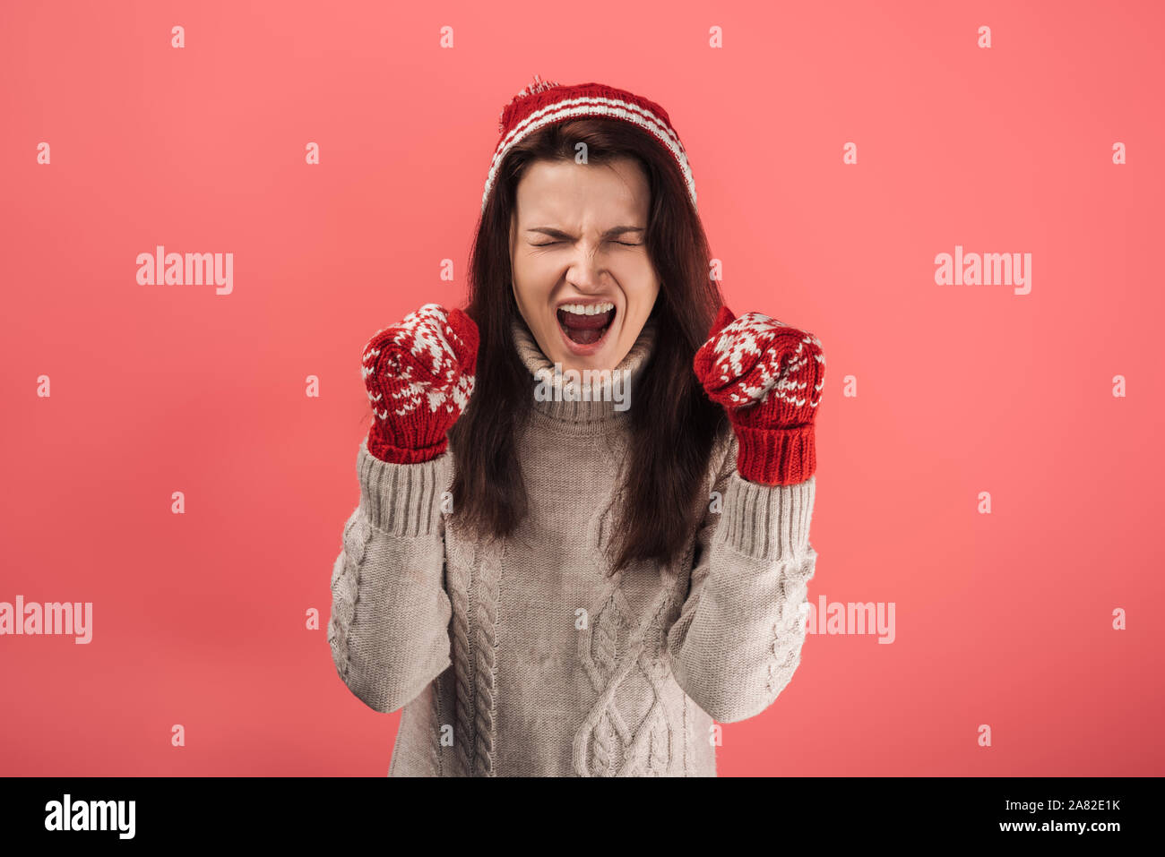 Angry woman in sweater hi-res stock photography and images - Alamy