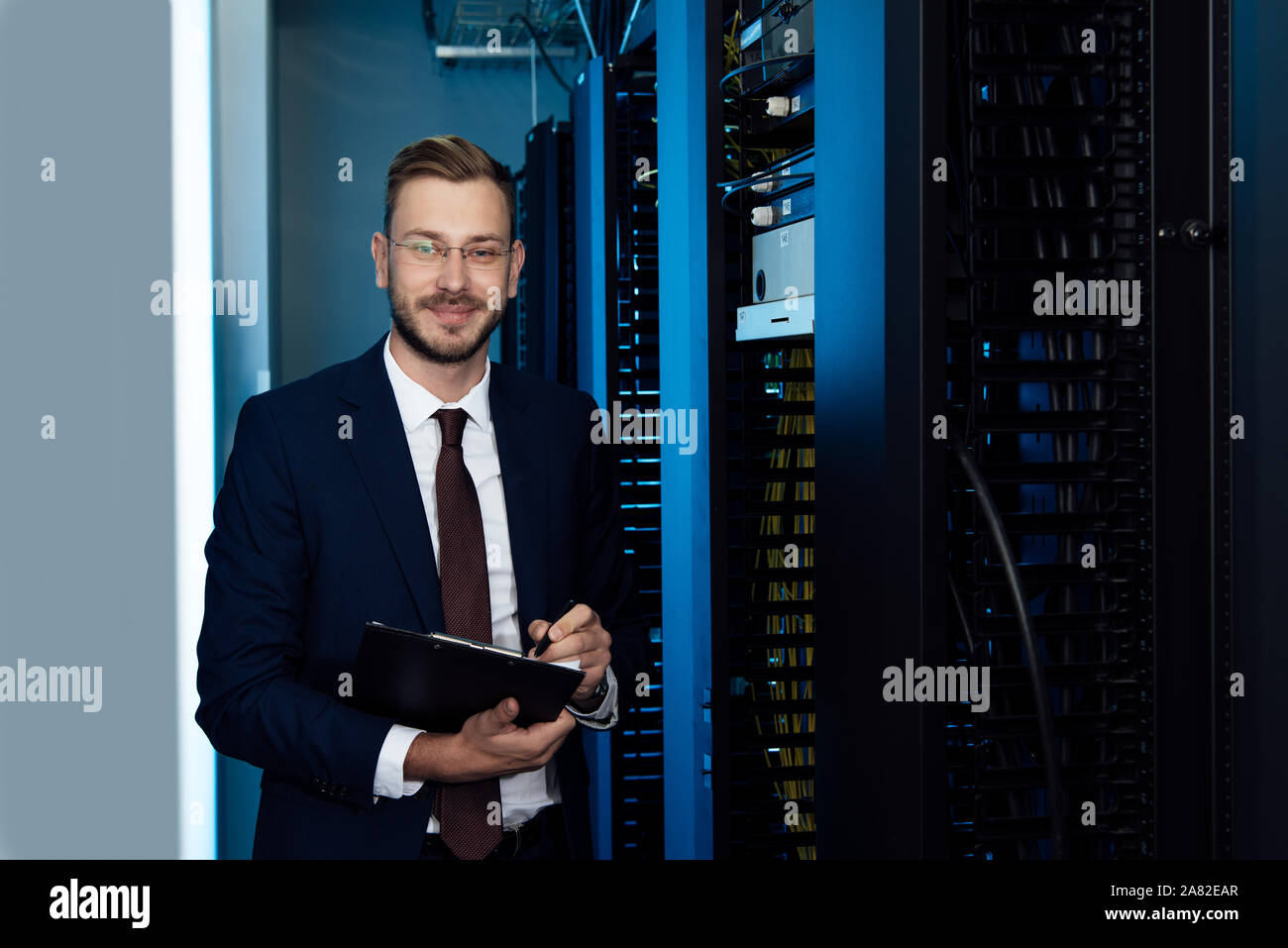 Happy in data center hi-res stock photography and images - Alamy