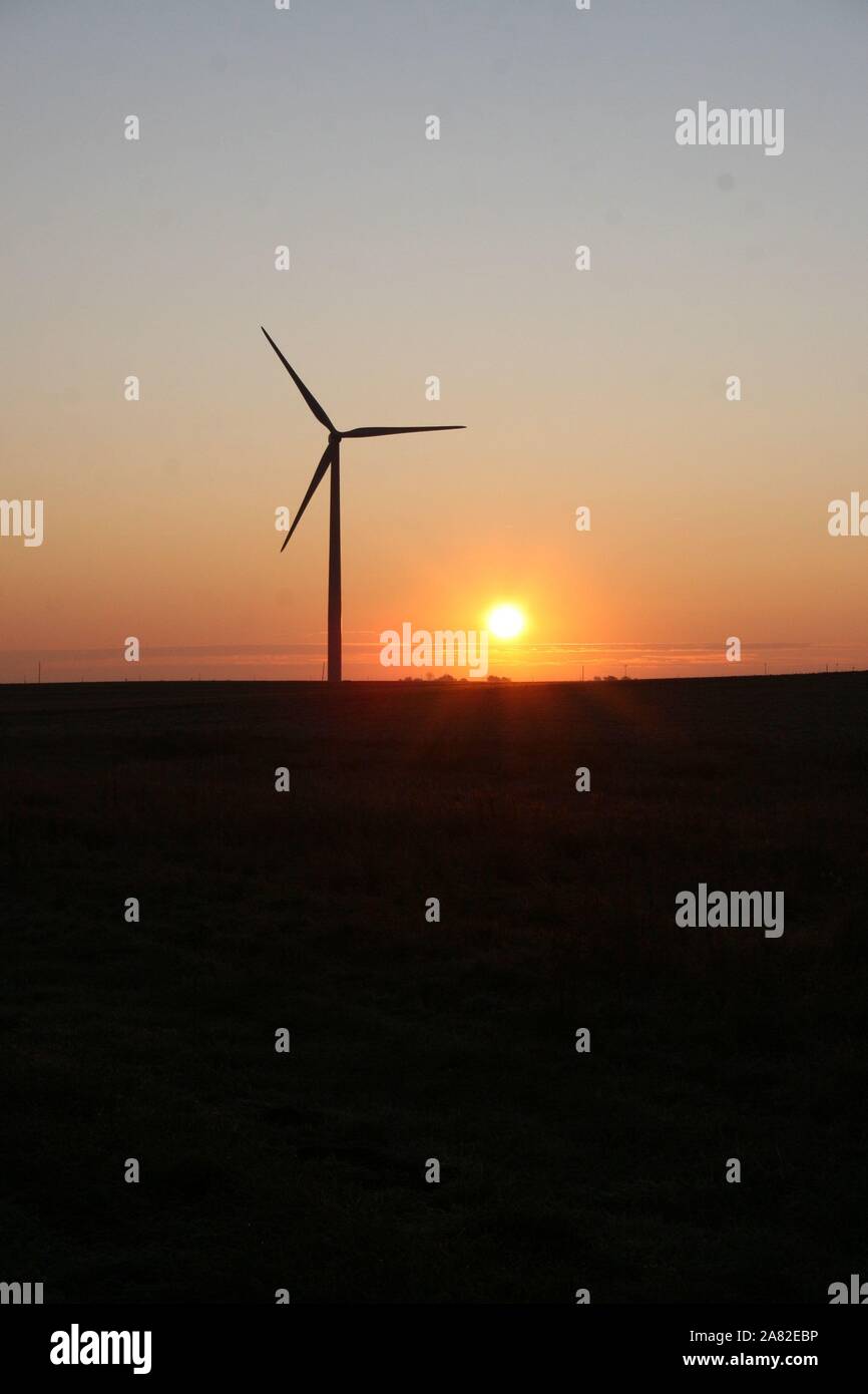 Rising Sun and wind energy Stock Photo - Alamy