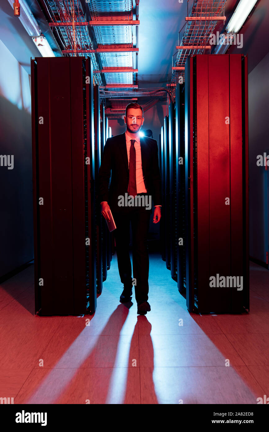 Businessman tablet server room hi-res stock photography and images - Alamy