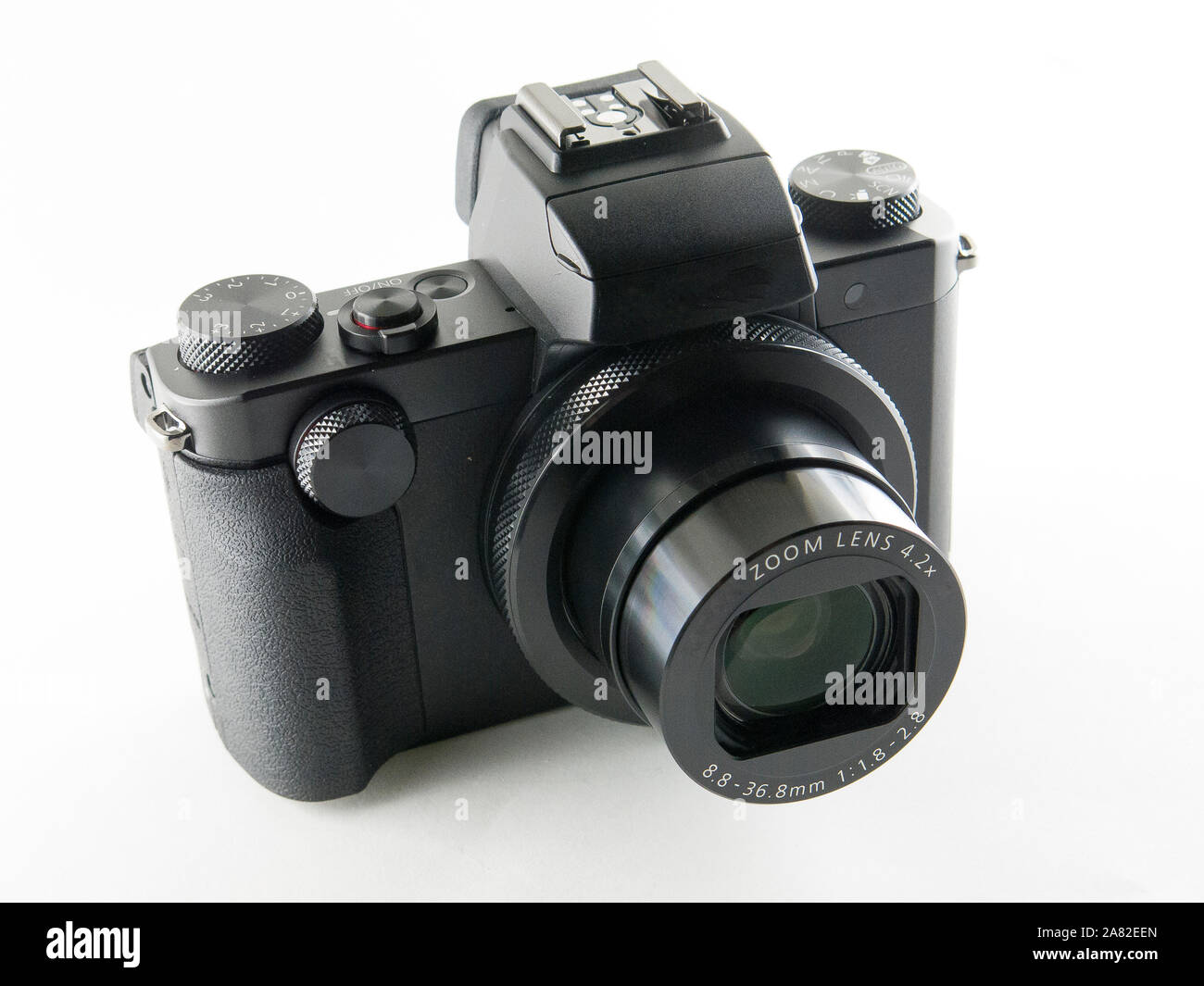 Close up on a Canon camera isolated on white background Stock Photo - Alamy