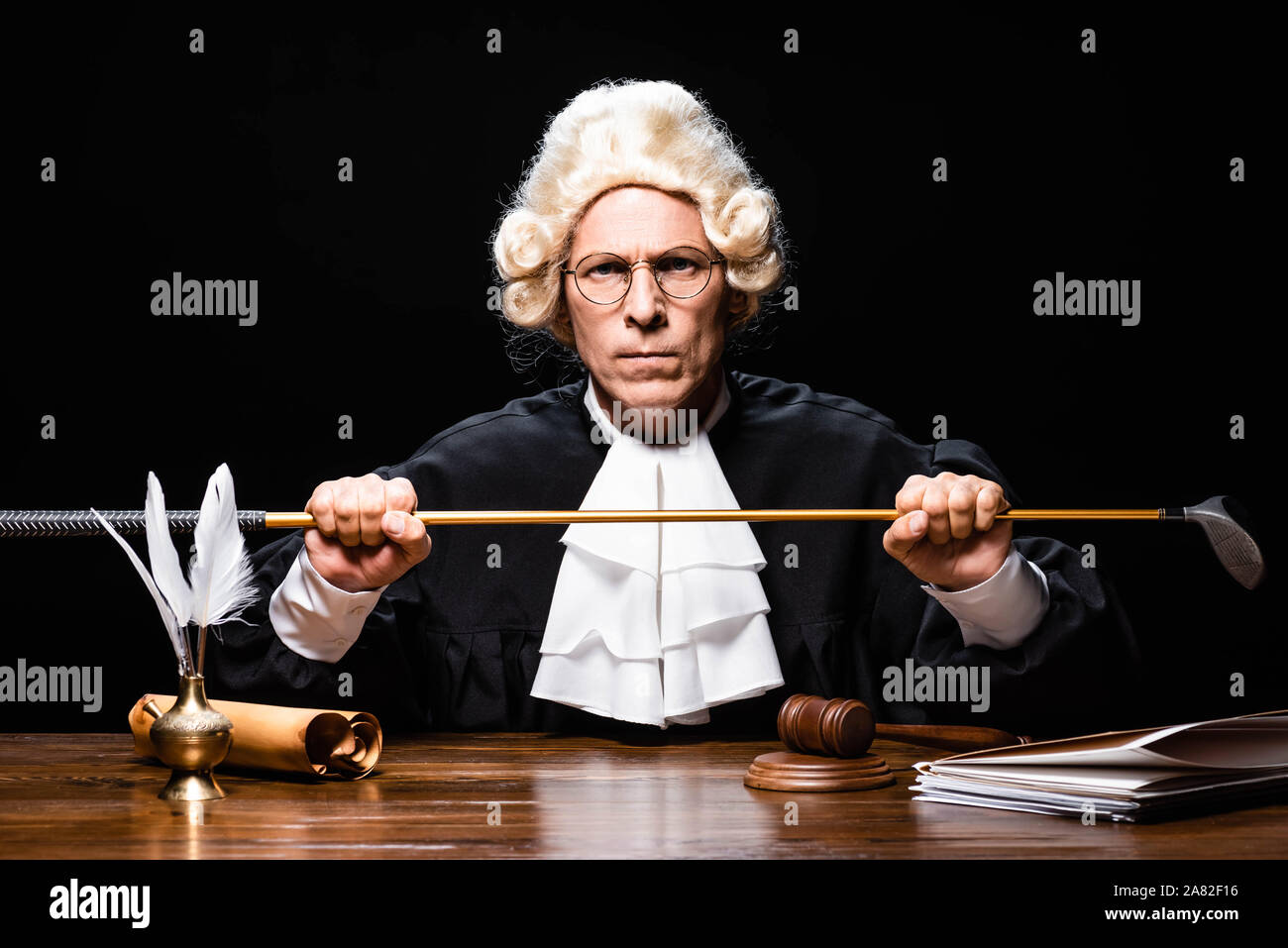 angry judge in judicial robe and wig holding golf club isolated on ...