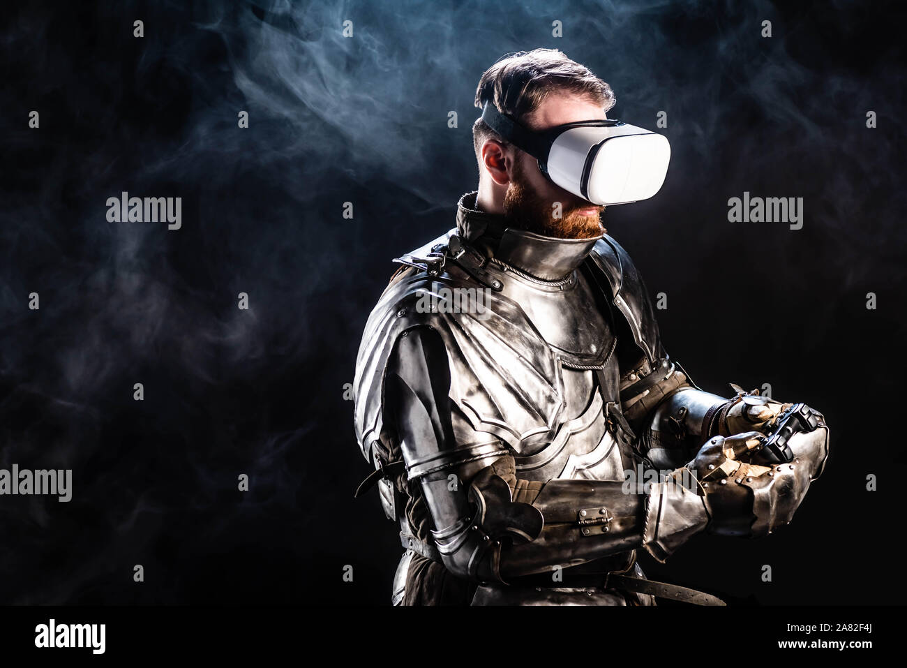 KYIV, UKRAINE - OCTOBER 9, 2019: knight with virtual reality headset in ...