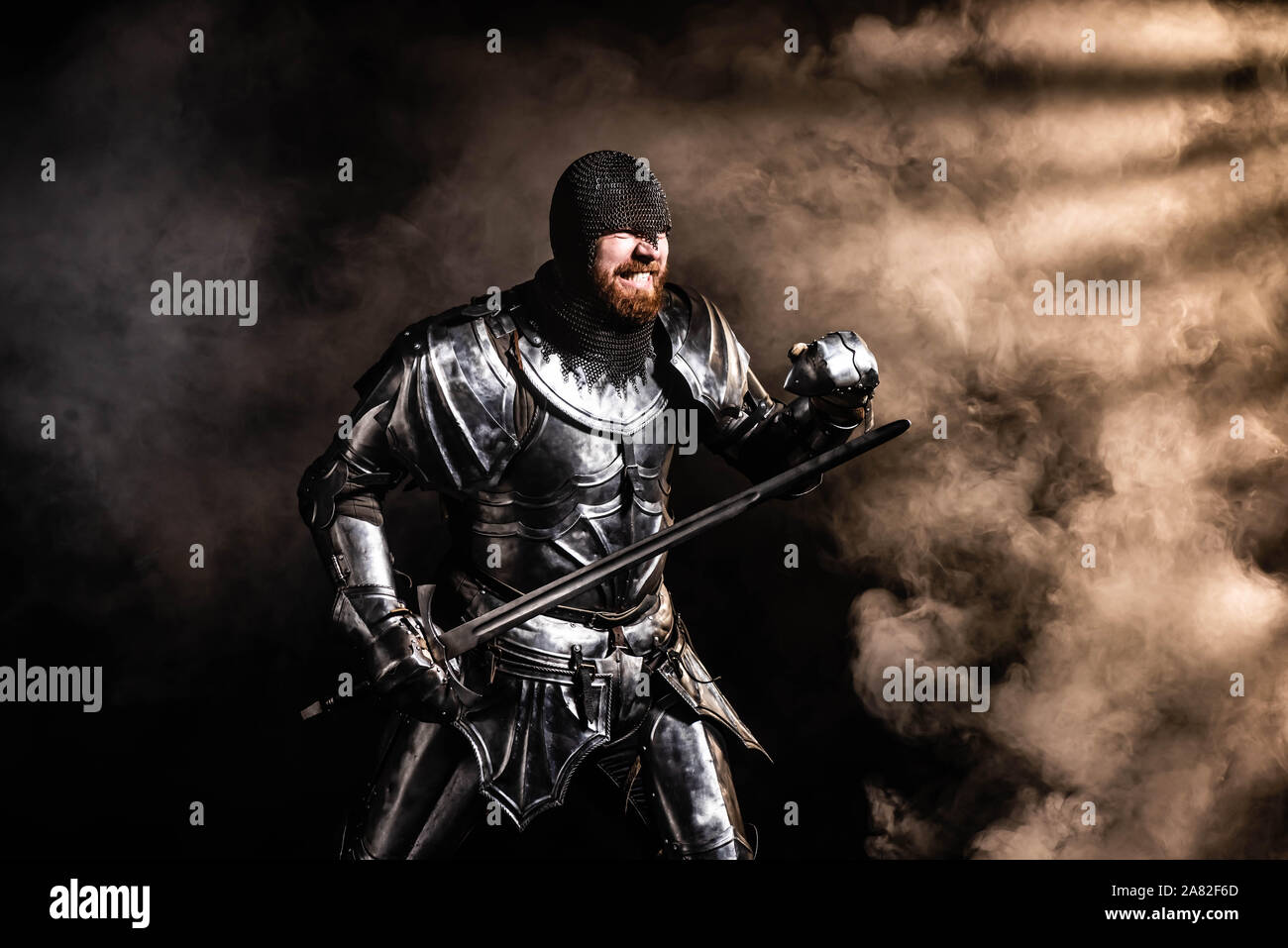 Angry medieval knight armor sword hi-res stock photography and images ...