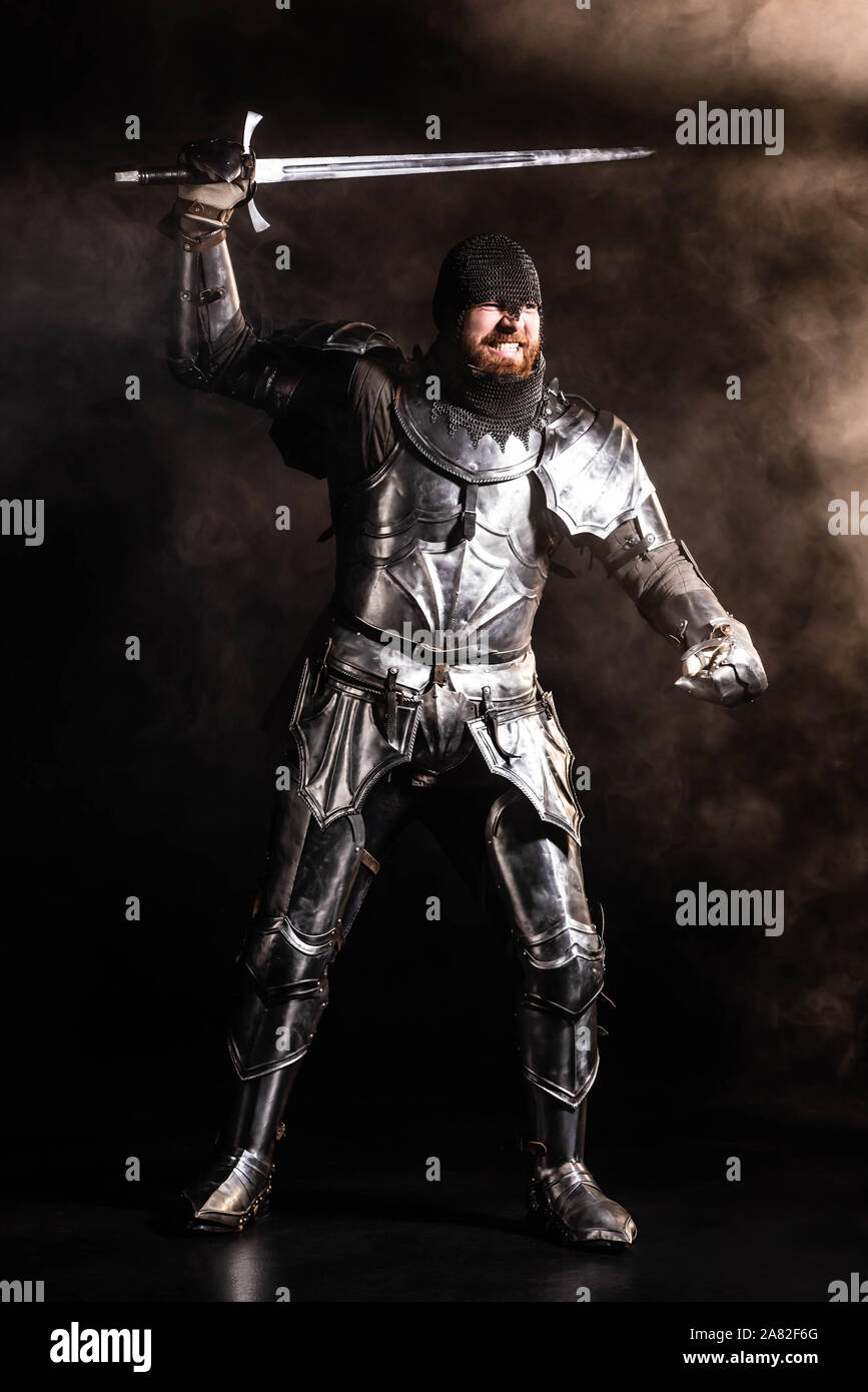 Angry medieval knight armor sword hi-res stock photography and images ...