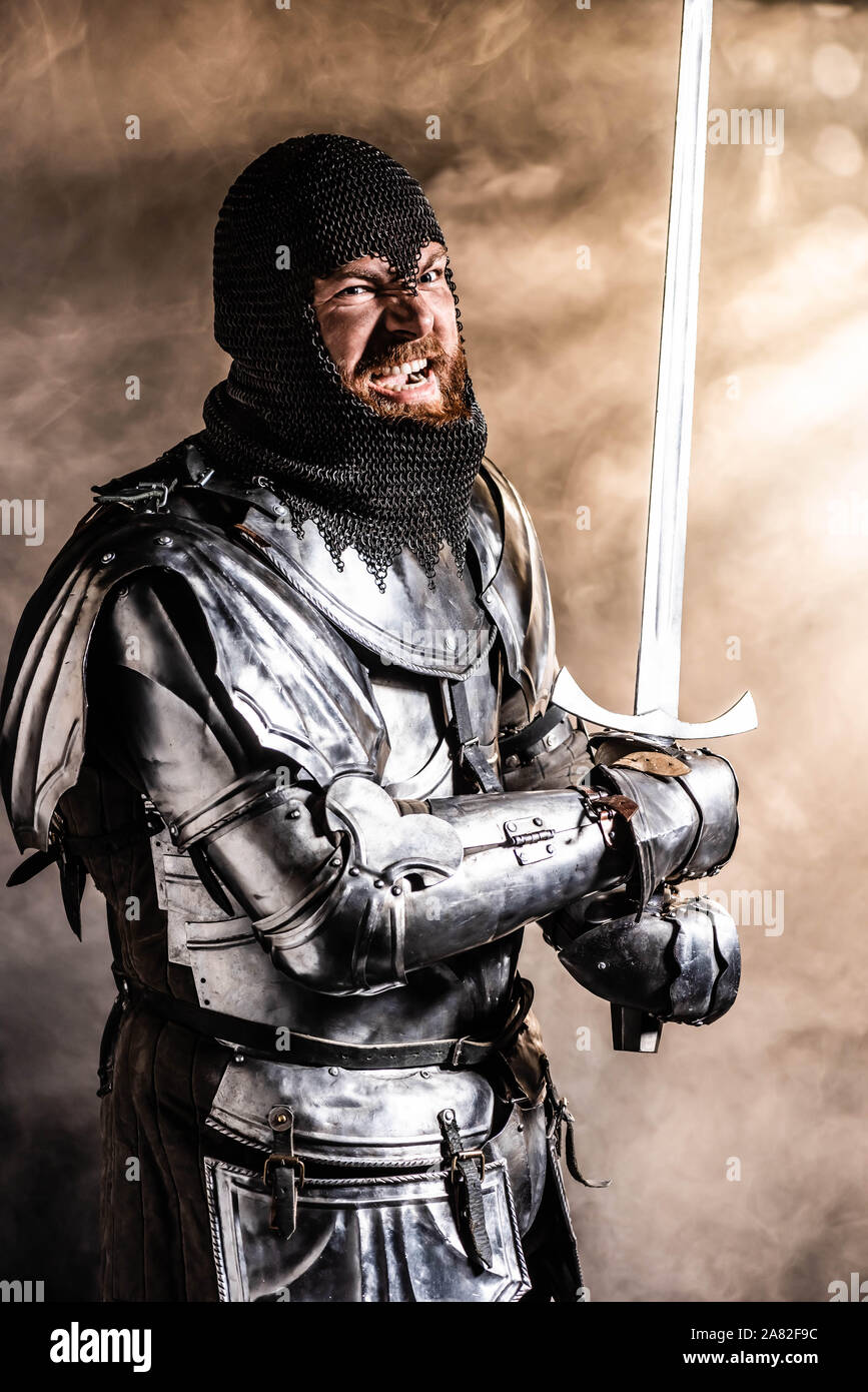 Angry medieval knight armor sword hi-res stock photography and images ...