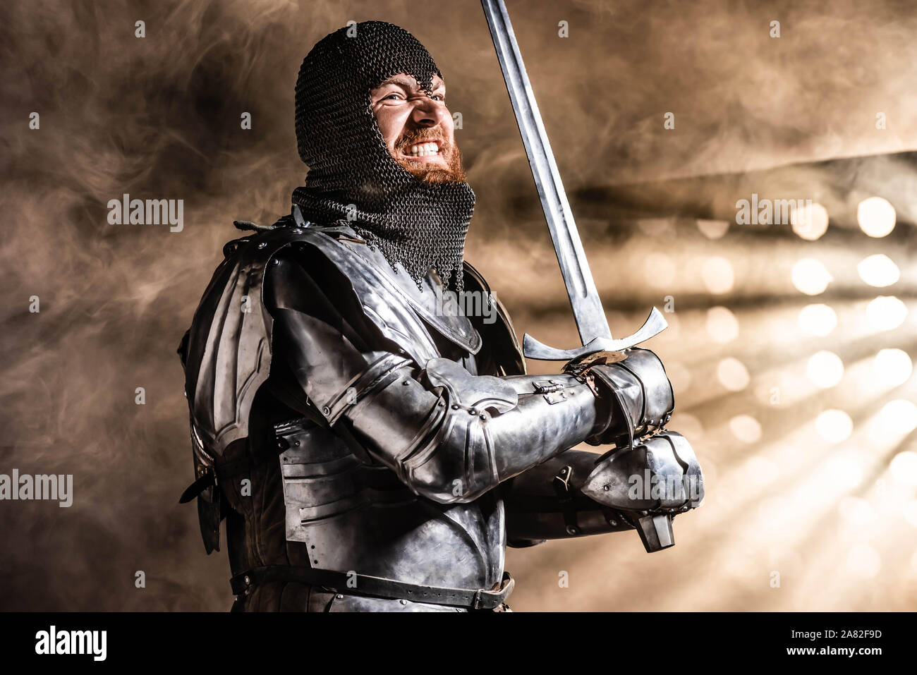 Angry medieval knight armor sword hi-res stock photography and images ...